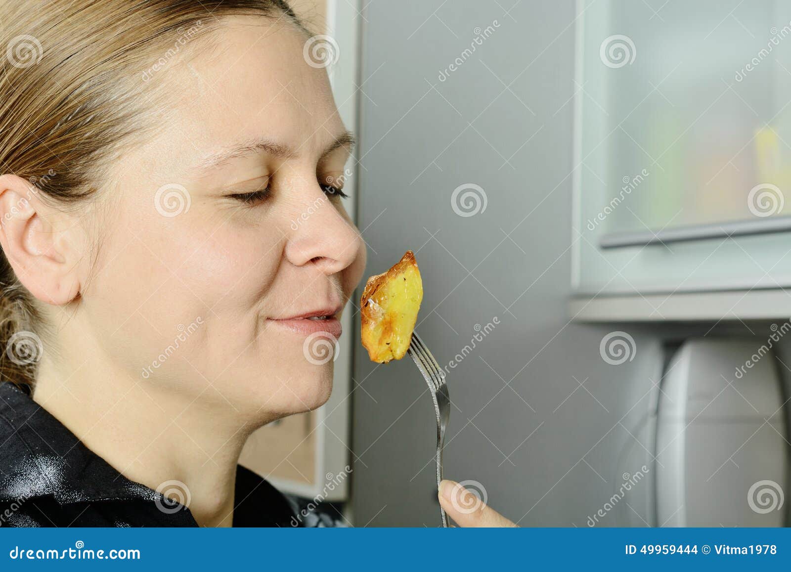 Woman smelling a food stock photo. Image of hunger, female - 49959444