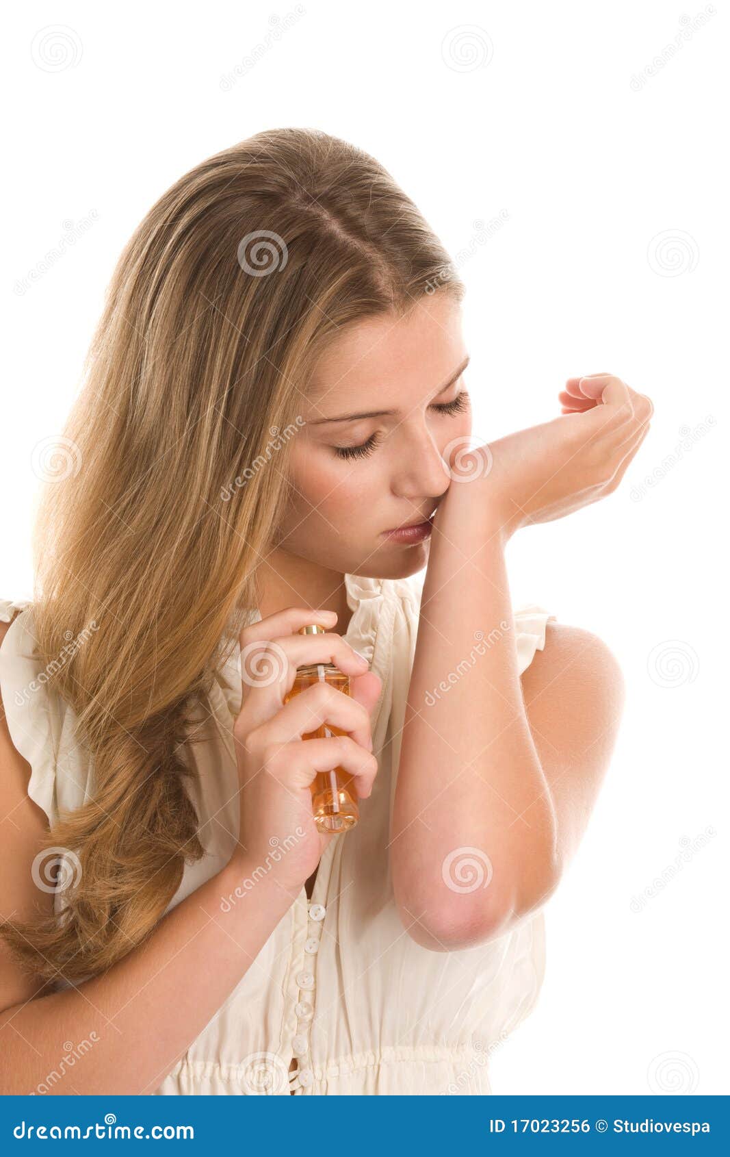 Woman smelling perfume stock photo. Image of cosmetic - 17023256