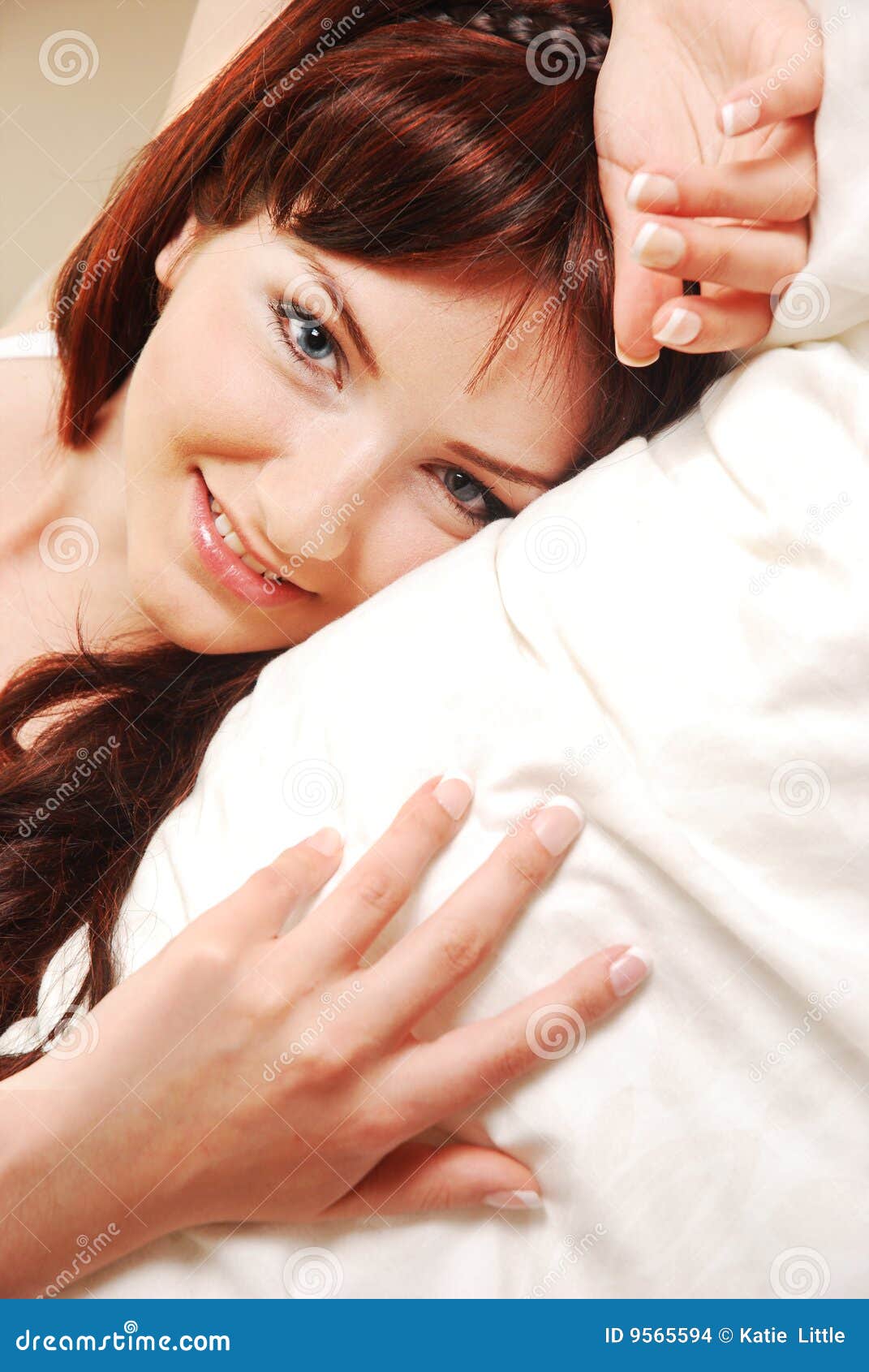 Woman smiling in bed stock photo. Image of pretty, sleep - 9565594