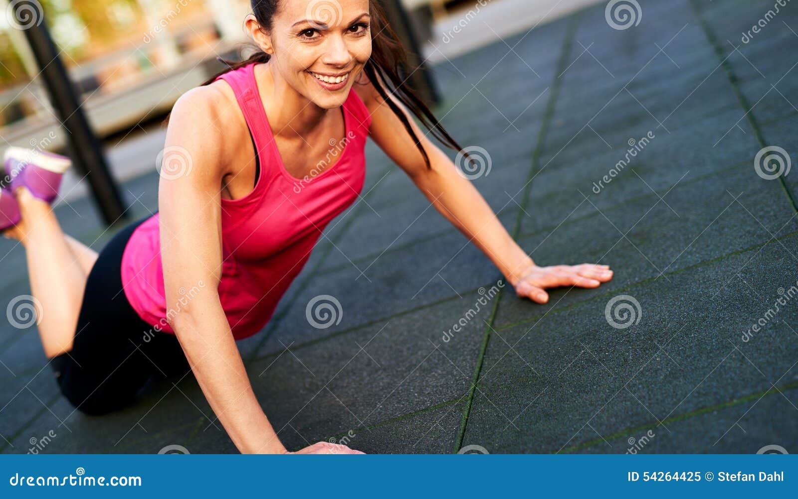 Woman Smiling Doing a Modified Push Up. Stock Image - Image of posture ...