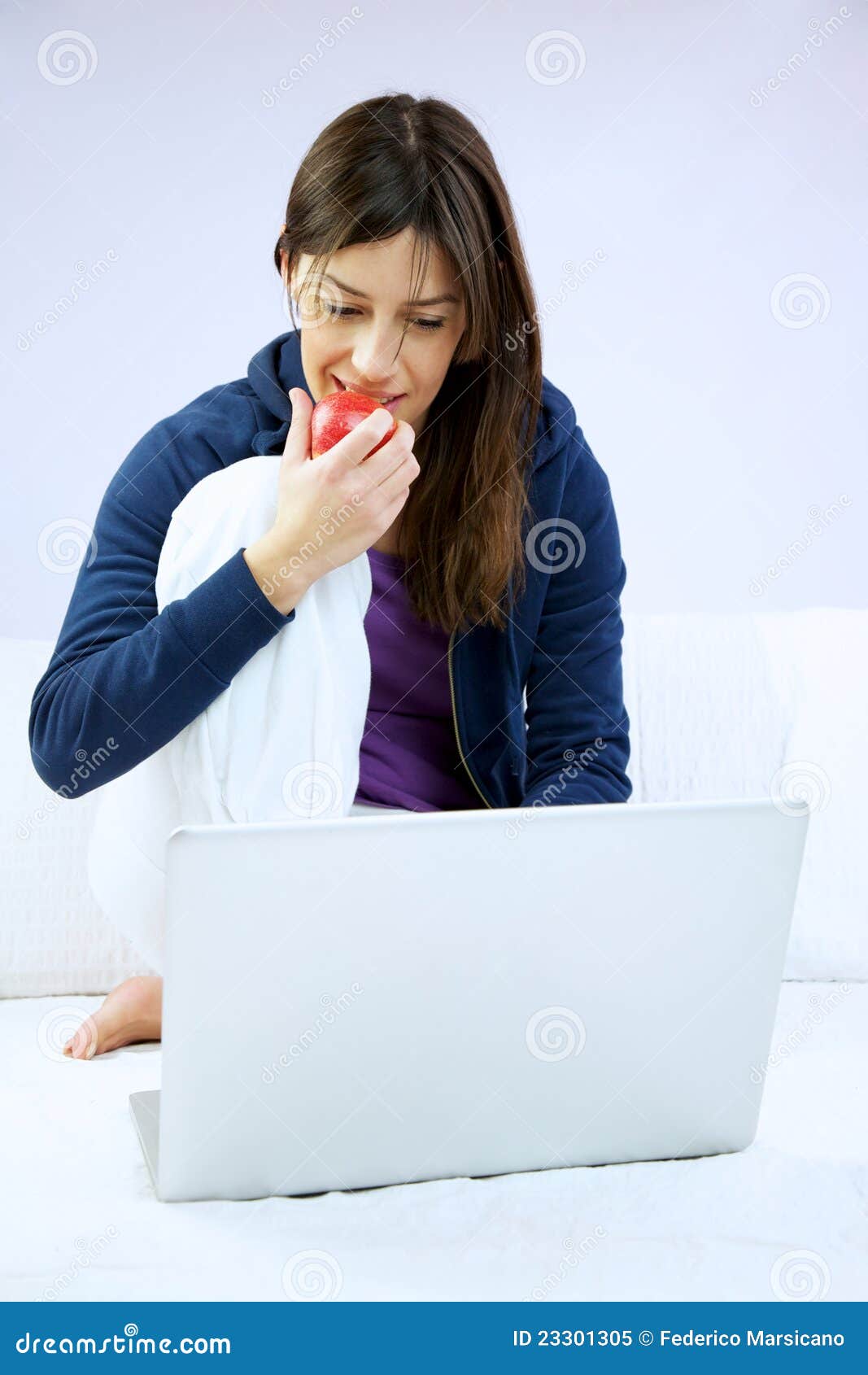 Woman Smiling Eats Apple Sitting with Computer Stock Image - Image of ...