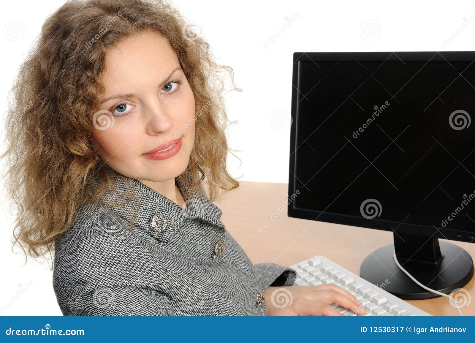 Woman Smiling in Front of Her Computer Stock Image - Image of monitor ...