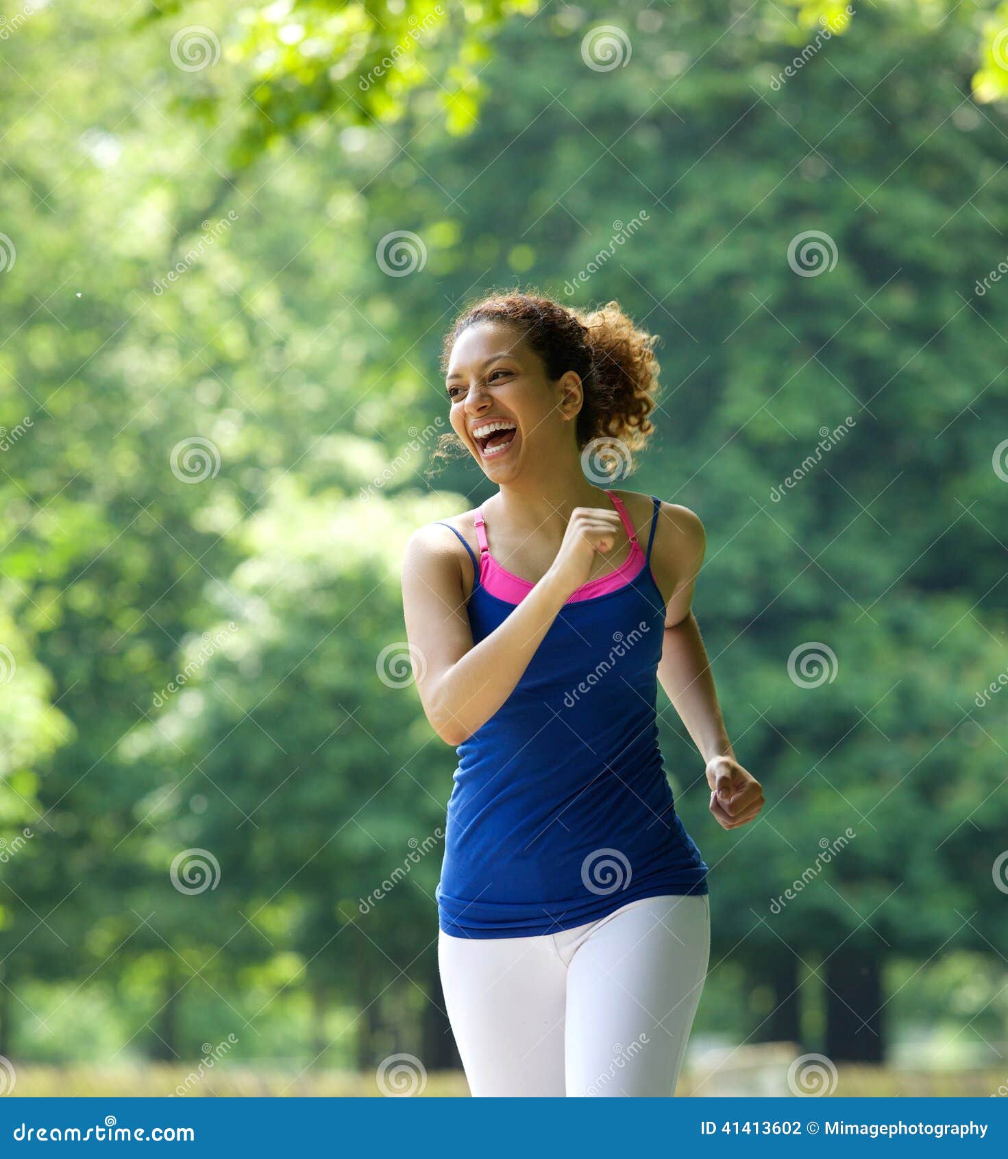 Woman Smiling and Jogging in the Park Stock Photo - Image of park ...