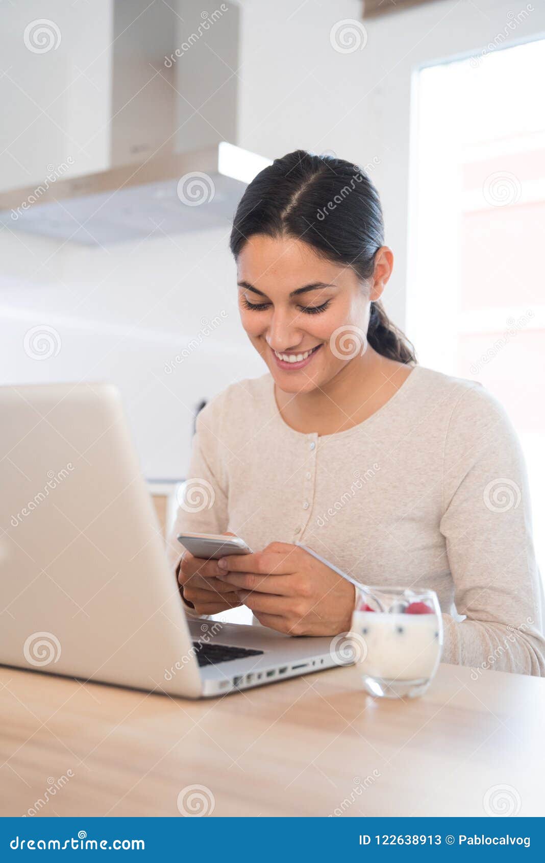 Woman Texting and Smiling on a Cell Phone Stock Image - Image of meal ...