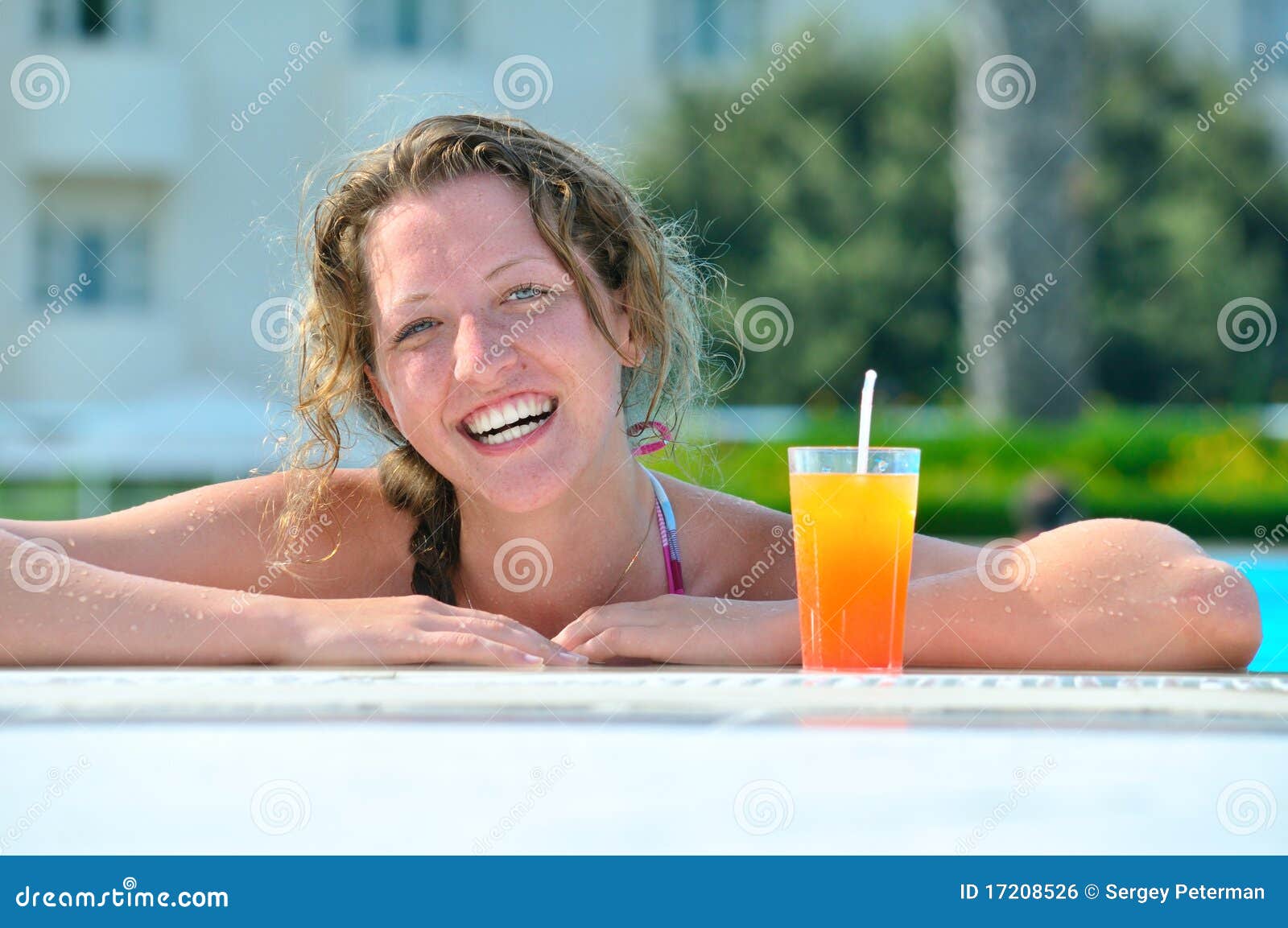 Woman is smiling from pool stock photo. Image of juice - 17208526