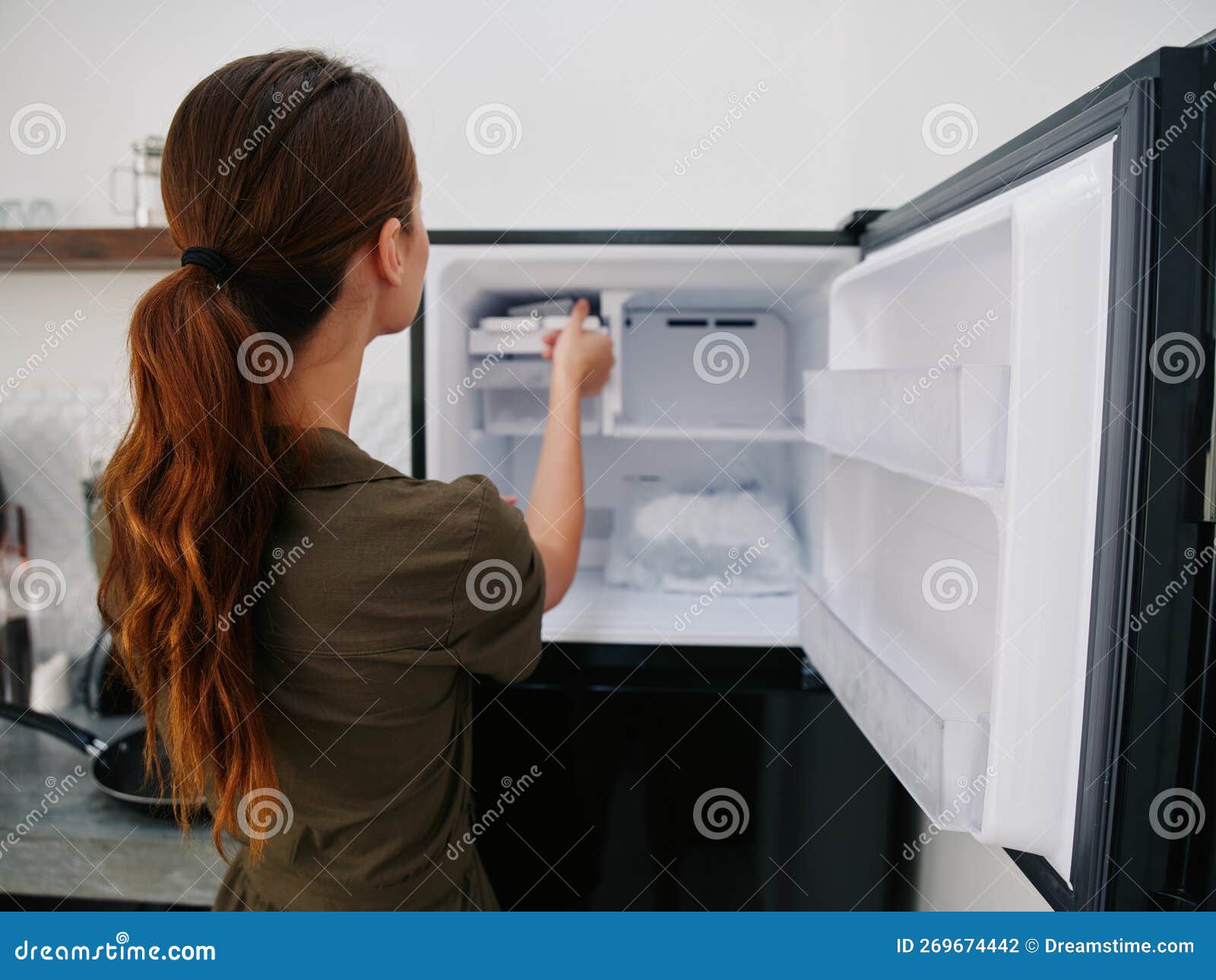 Woman Smiling with Teeth Looking into Camera in Kitchen at Home Opened ...