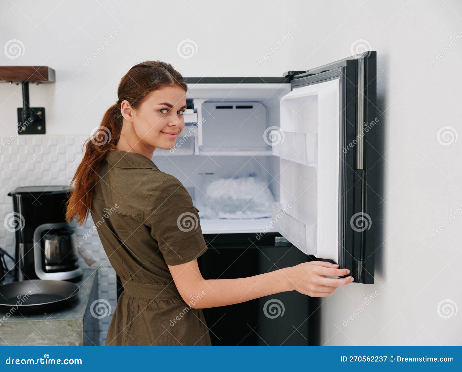 Woman Smiling with Teeth Looking into Camera in Kitchen at Home Opened ...
