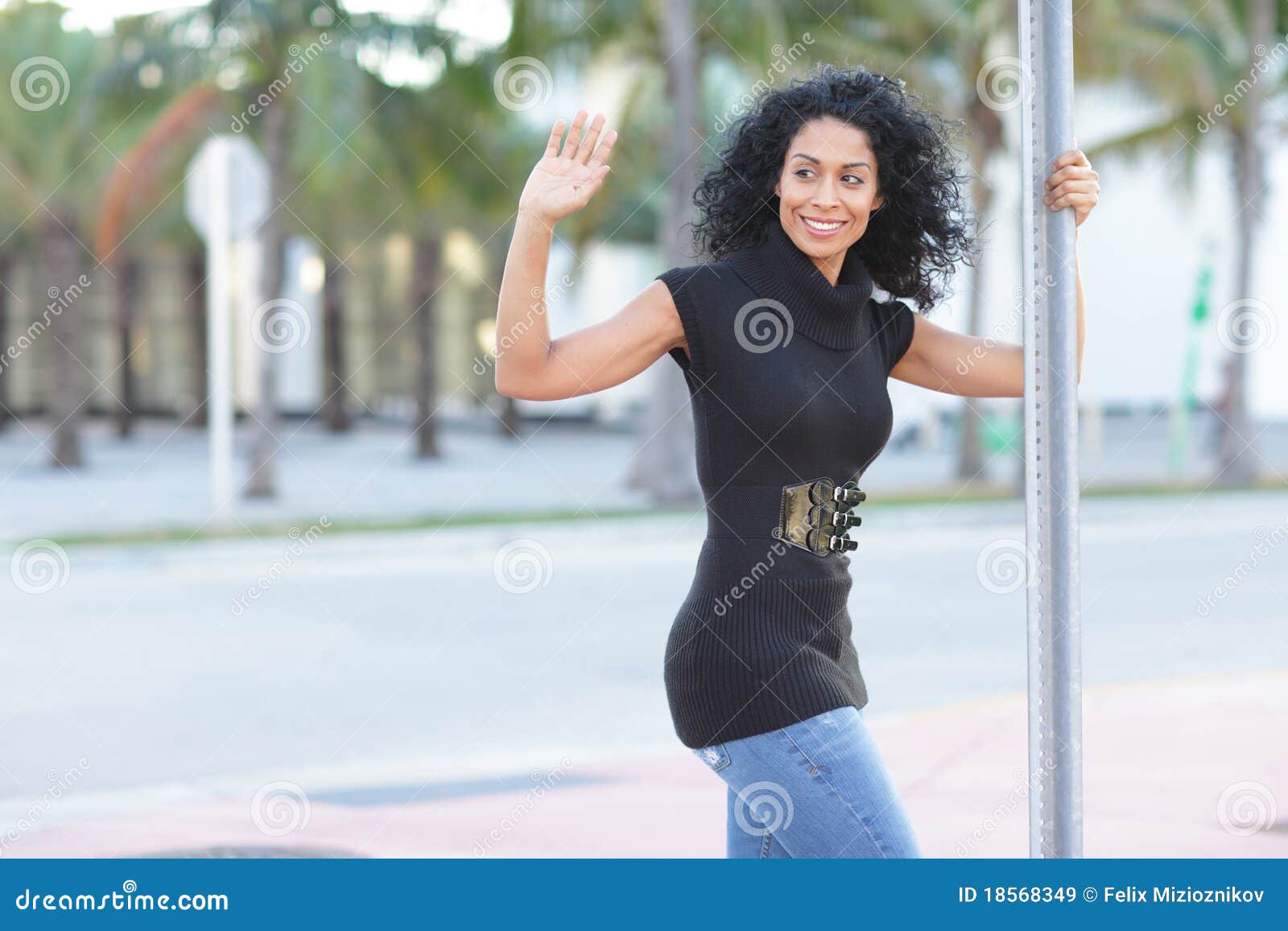 Woman smiling and waving stock image. Image of pretty - 18568349
