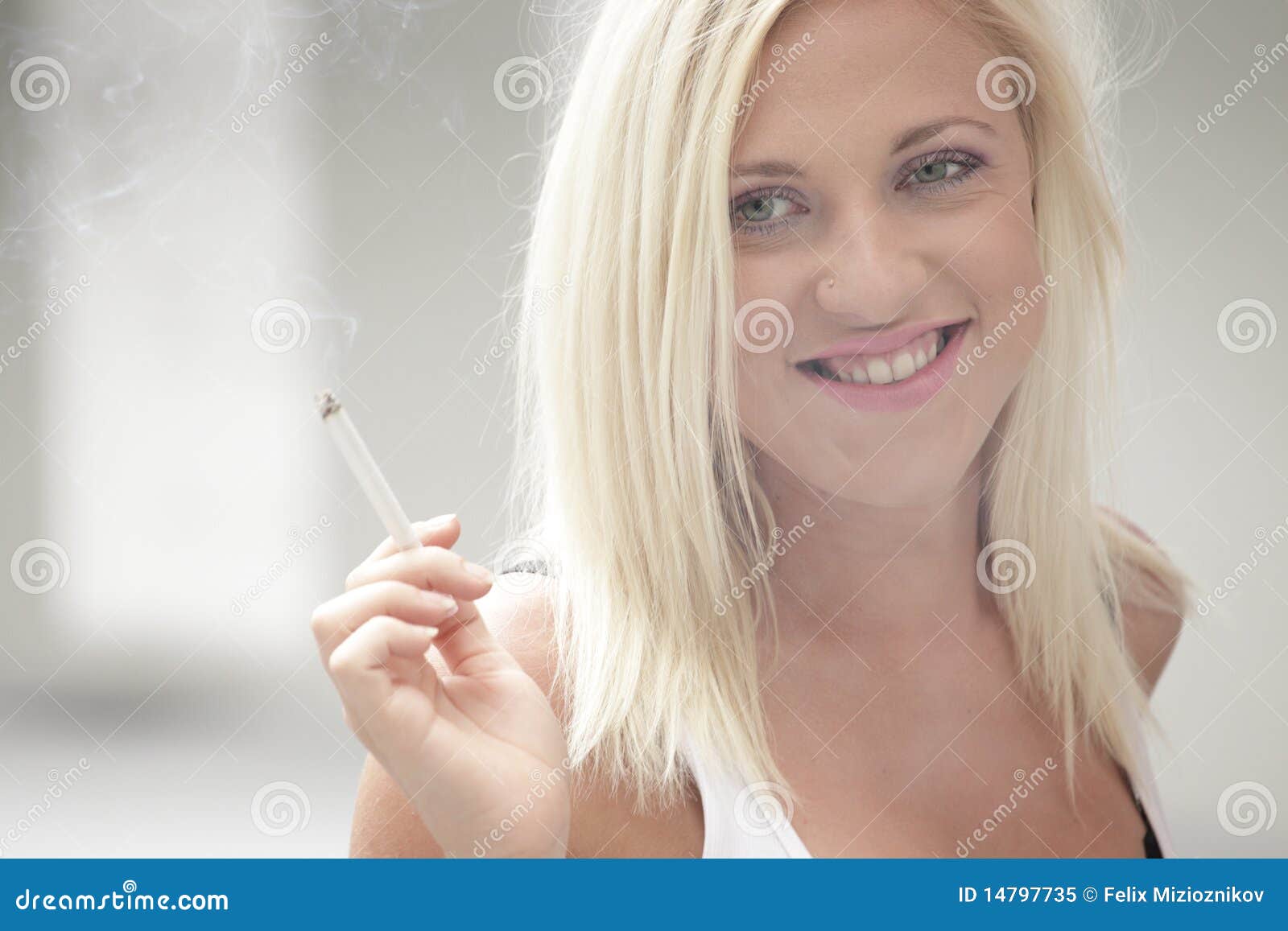 Woman smoking a cigarette stock image. Image of cute - 14797735