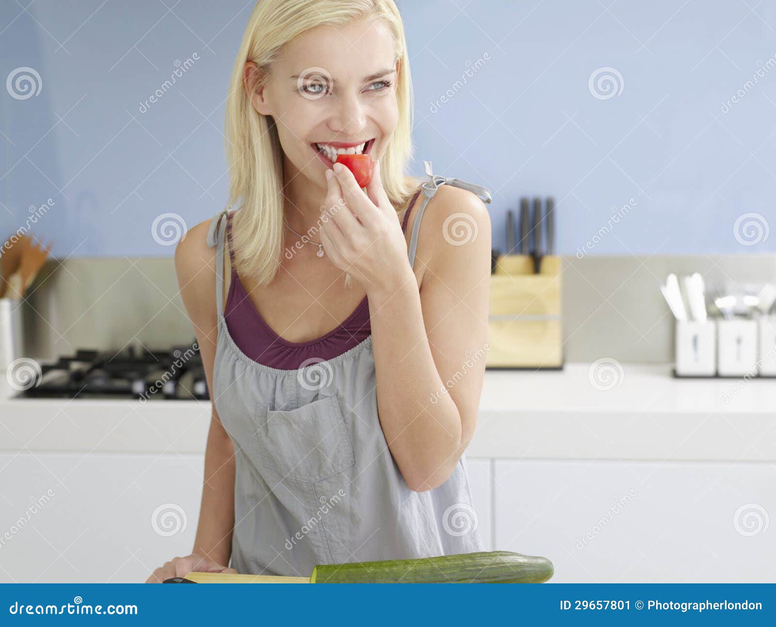 Woman Snacking on Cherry Tomato Stock Image - Image of horizontal ...