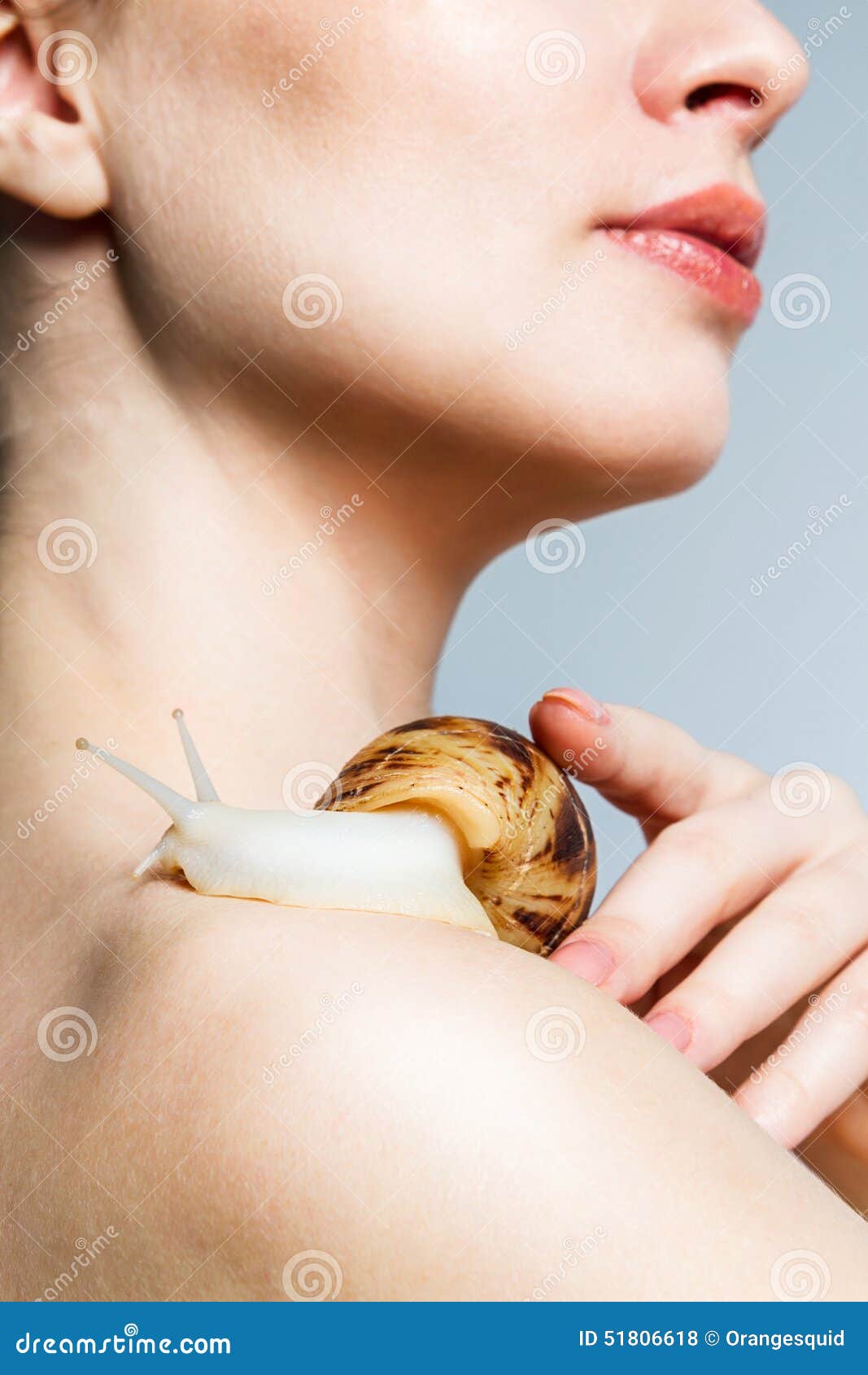 A woman with a snail stock photo. Image of treatment - 51806618