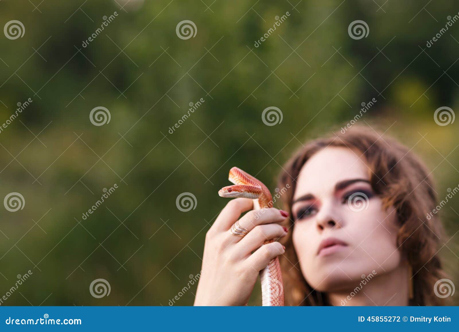 Woman with snake stock photo. Image of eyes, holding - 45855272