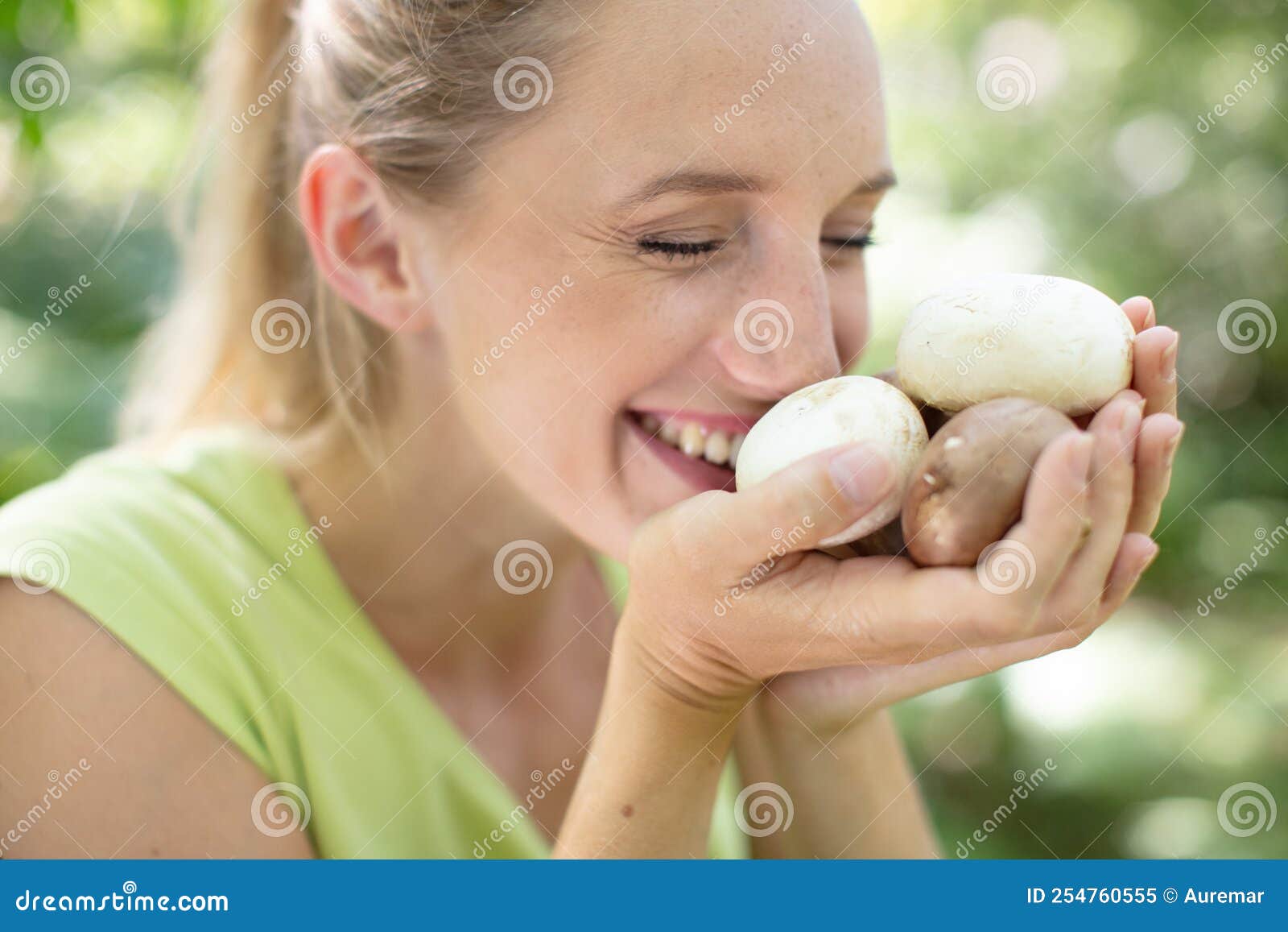 Woman Sniffing Mushroom in Forest Stock Image - Image of nose, hair ...