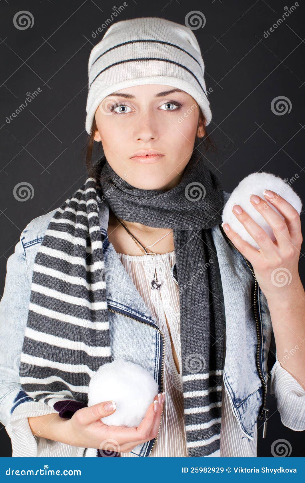 A woman with snowballs stock image. Image of people, close - 25982929