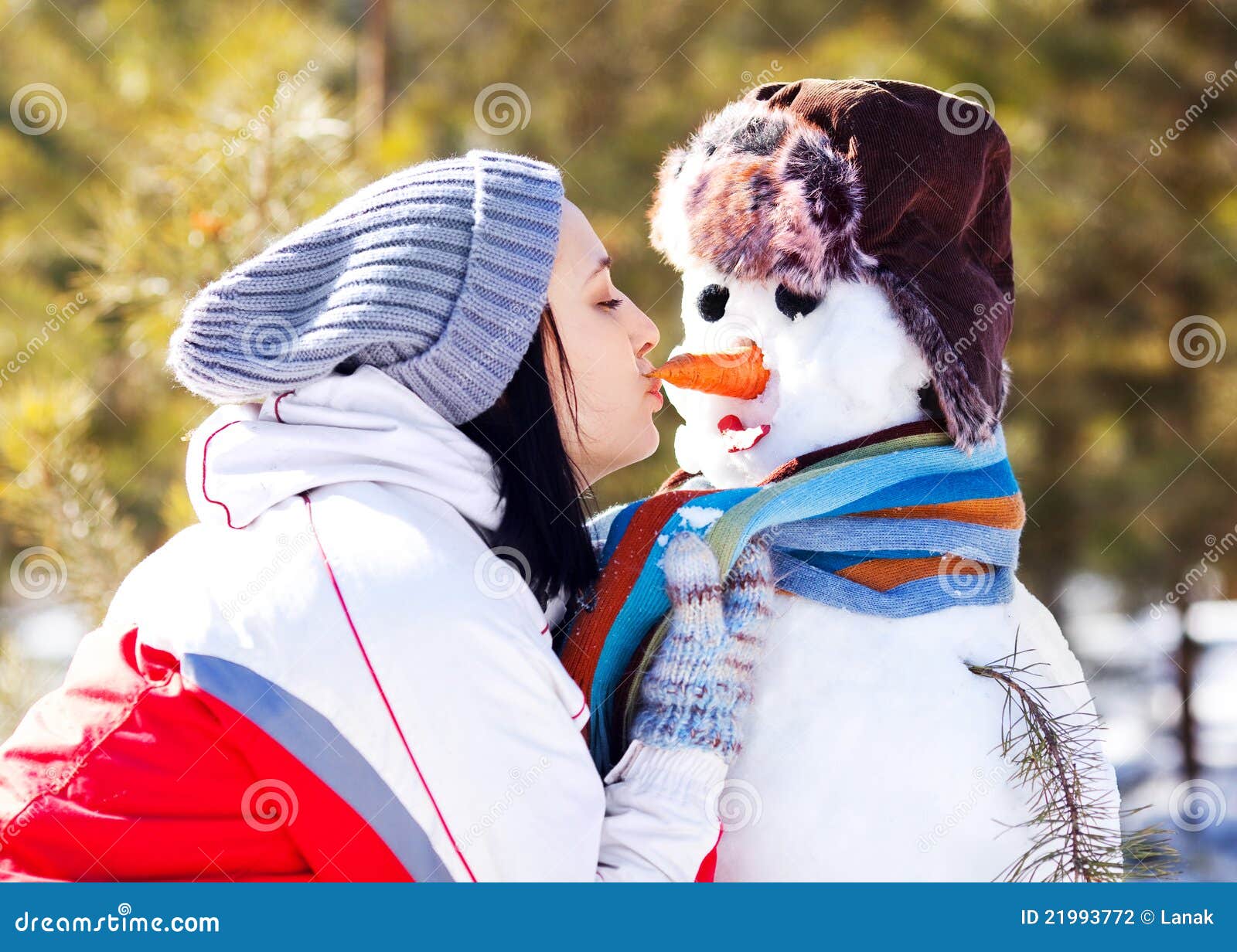 Woman with a snowman stock photo. Image of nature, people - 21993772