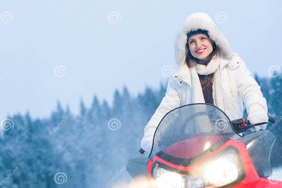 Woman and snowmobile stock photo. Image of attractive - 29609322