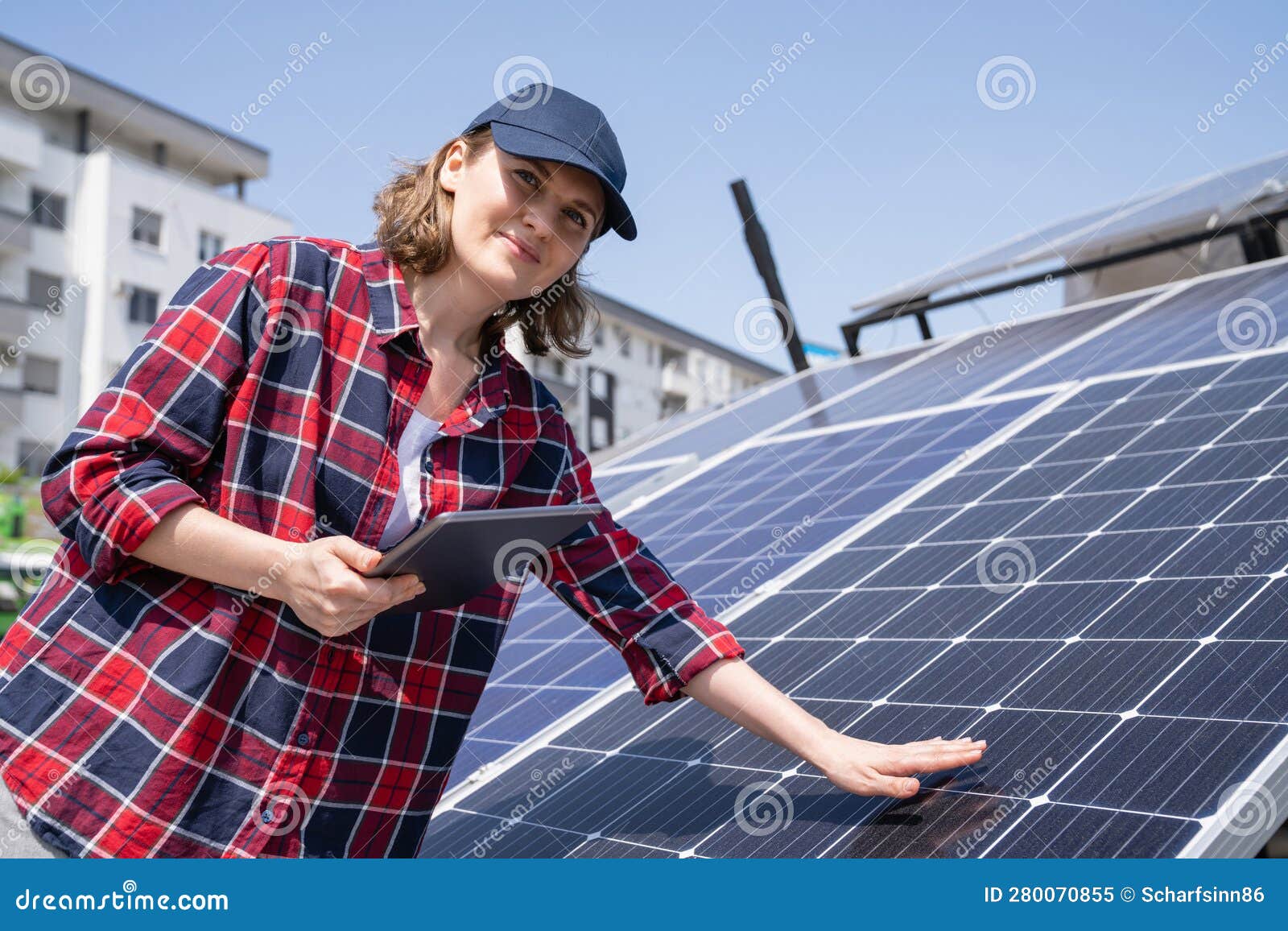 Woman with solar panel stock image. Image of photovoltaic - 280070855