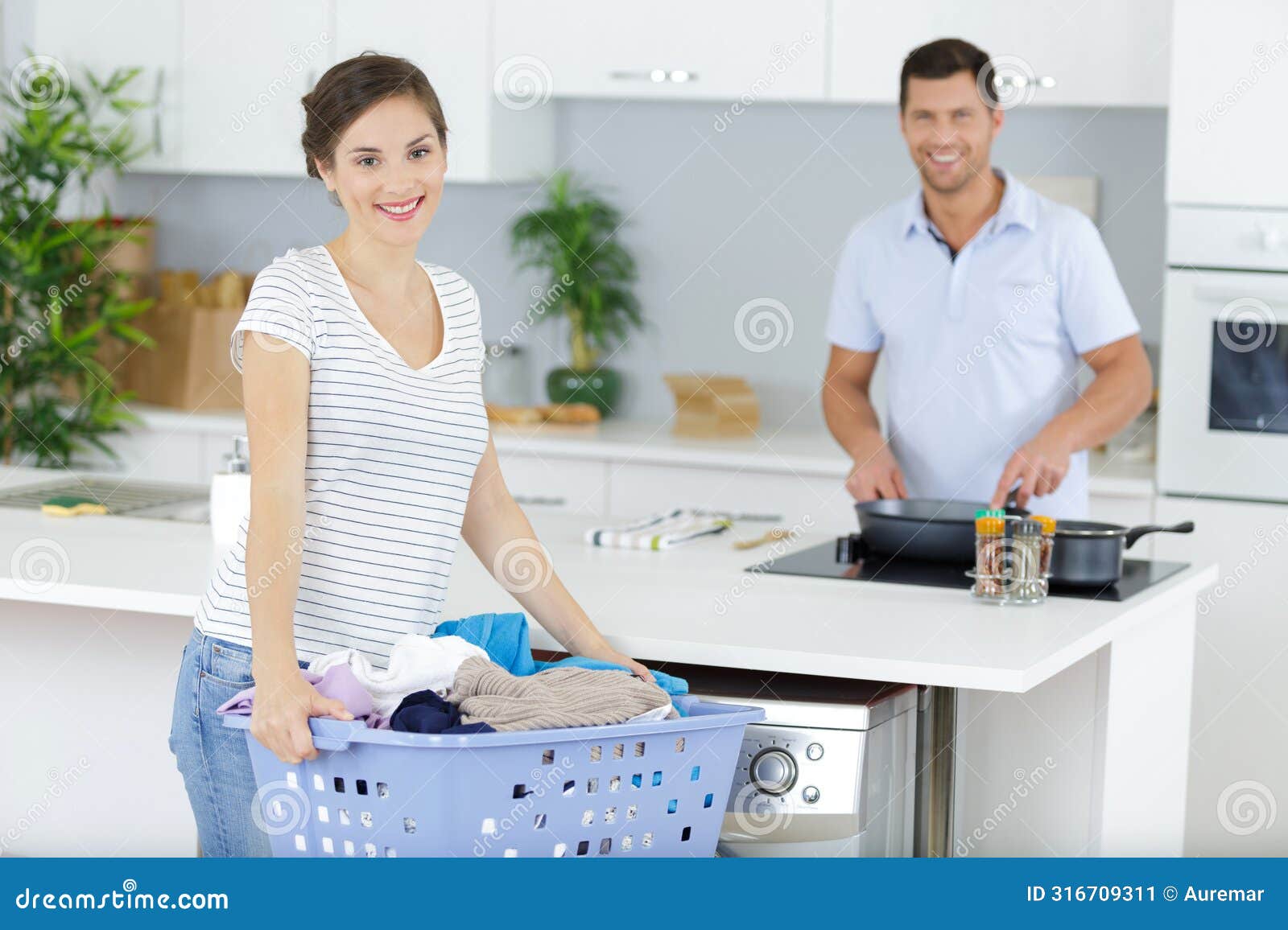 Woman Sorting Laundry Basket Stock Image - Image of homemaker, indoors ...