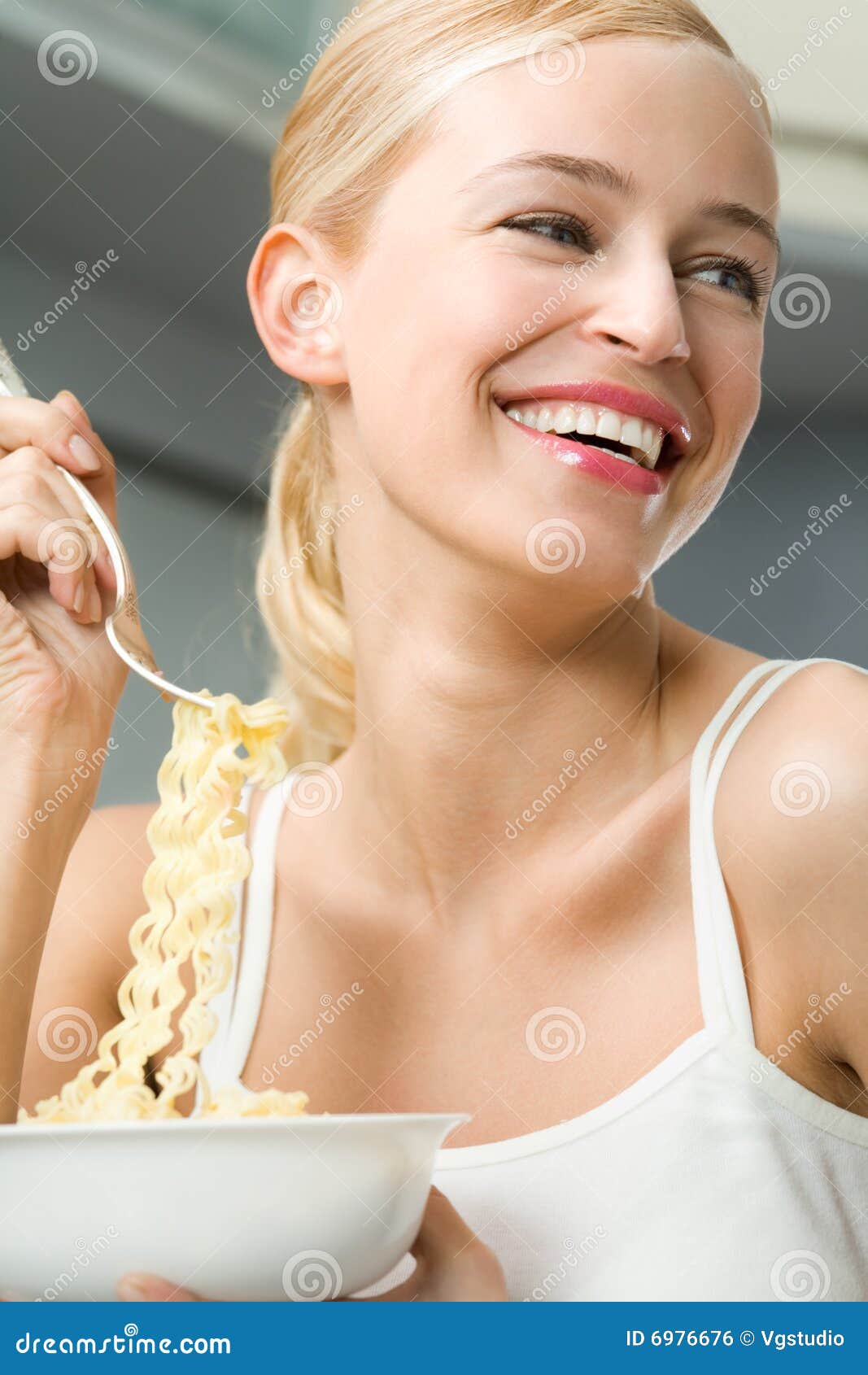 Woman with spaghetti stock photo. Image of blond, female - 6976676