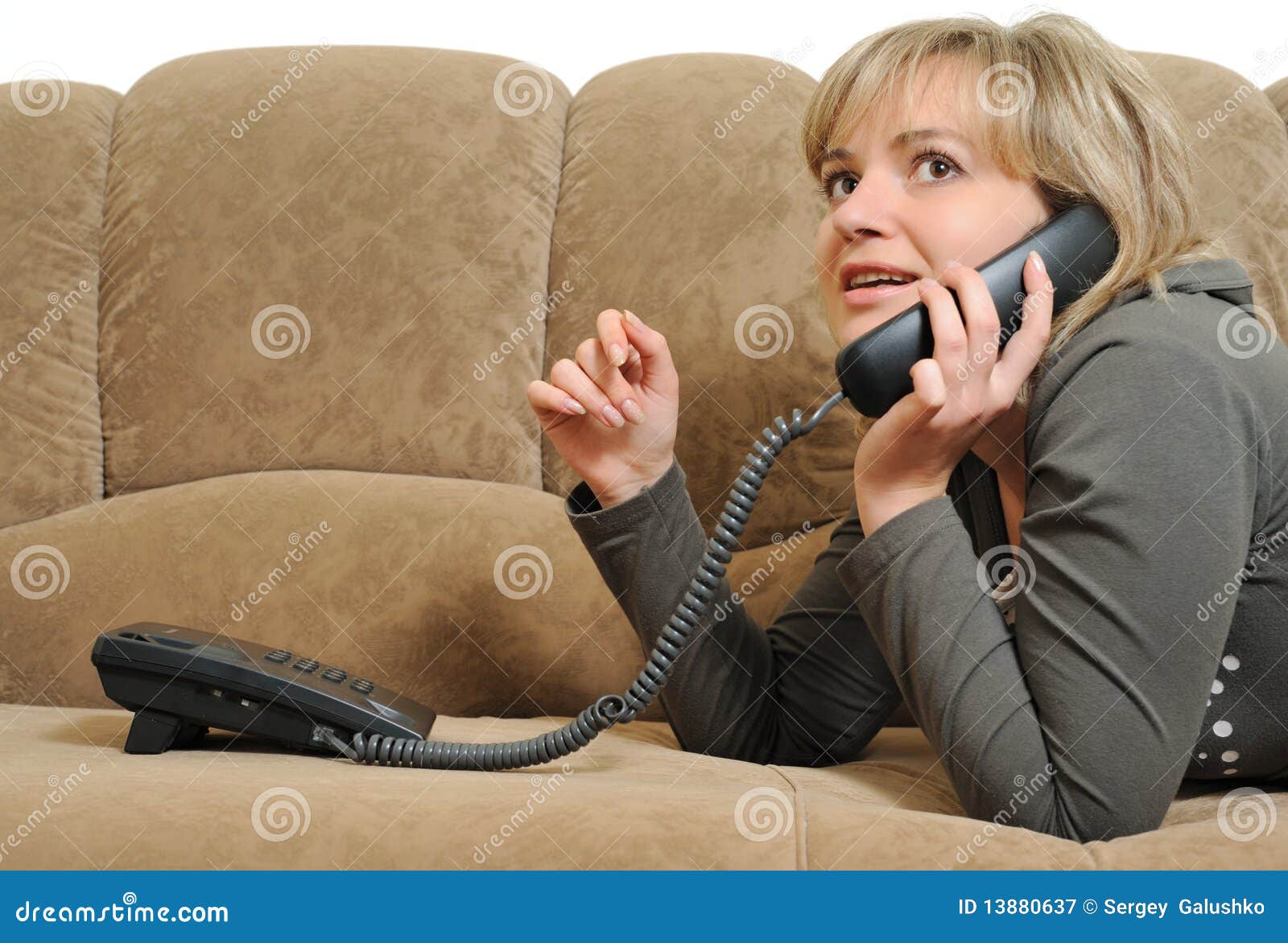 The Woman Speaking by Phone on a Sofa Stock Image - Image of people ...