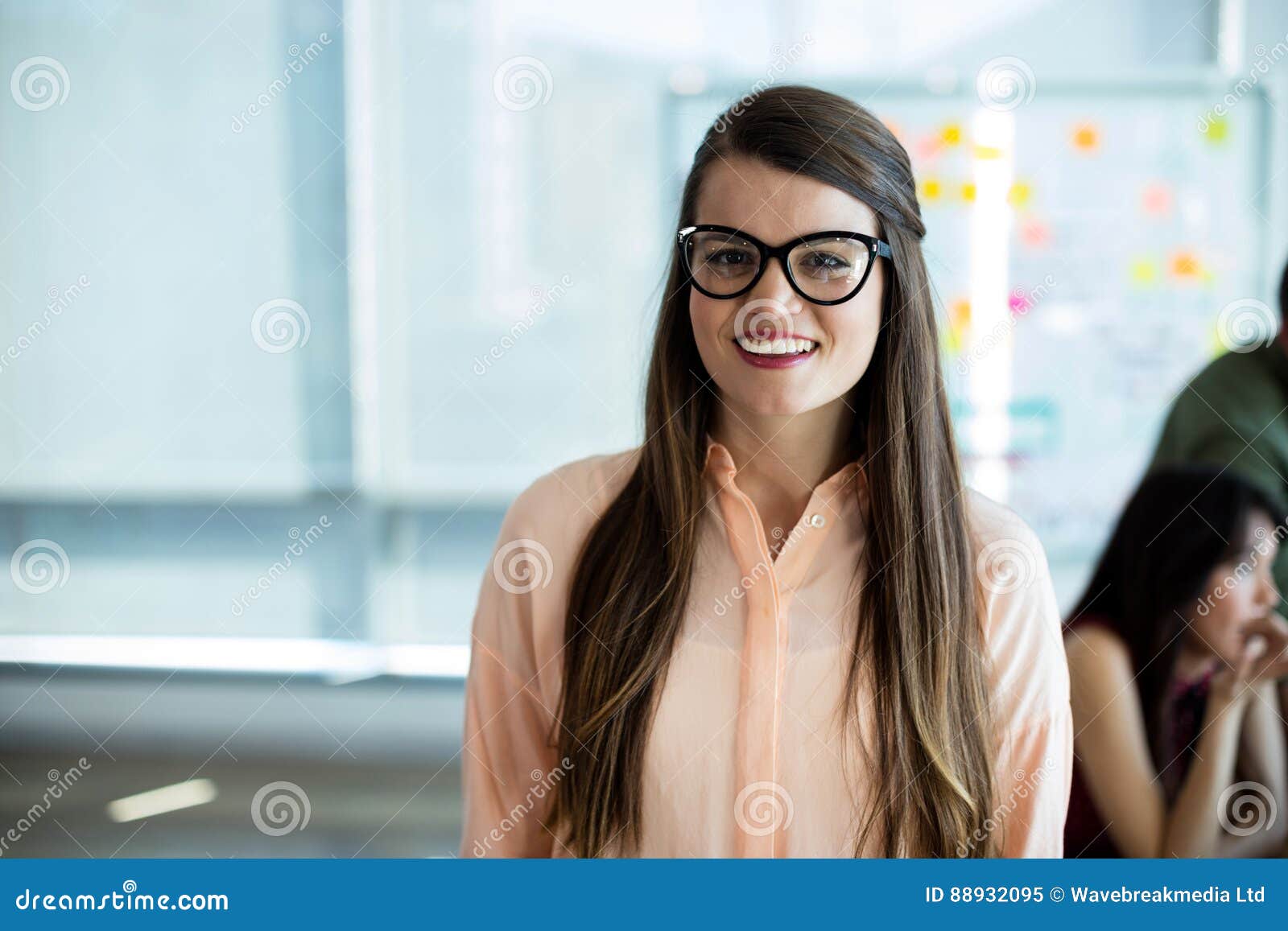 Woman in Spectacles Smiling in Office Stock Image - Image of smart ...