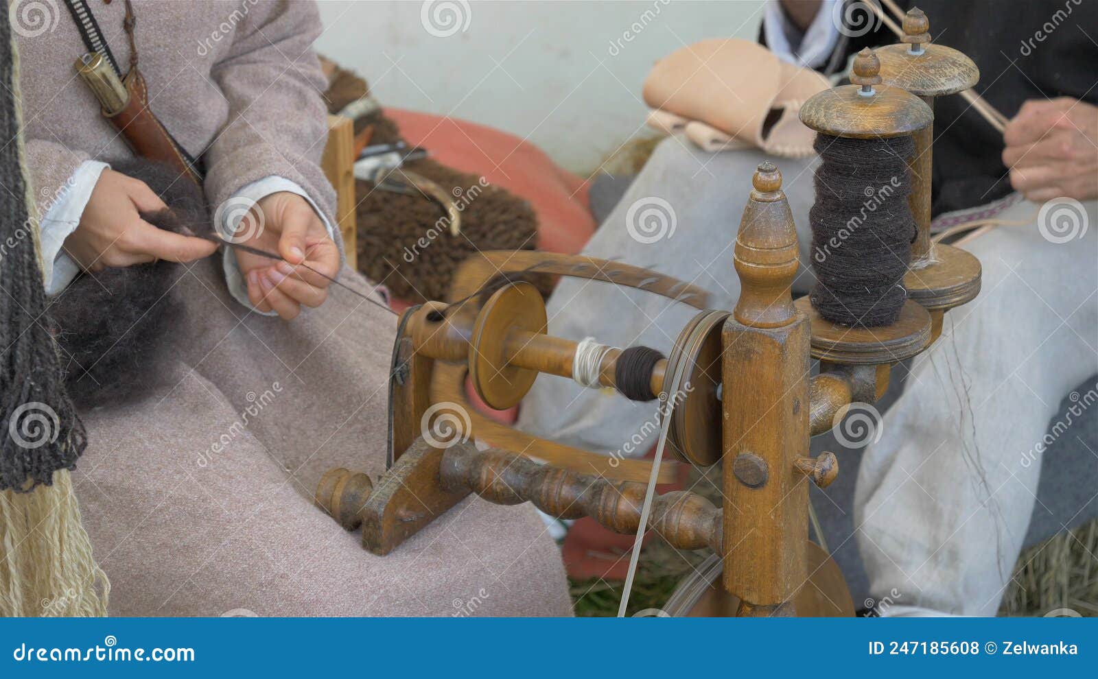 Woman is Spinning Wool on a Spinning Wheel Stock Photo - Image of craft ...