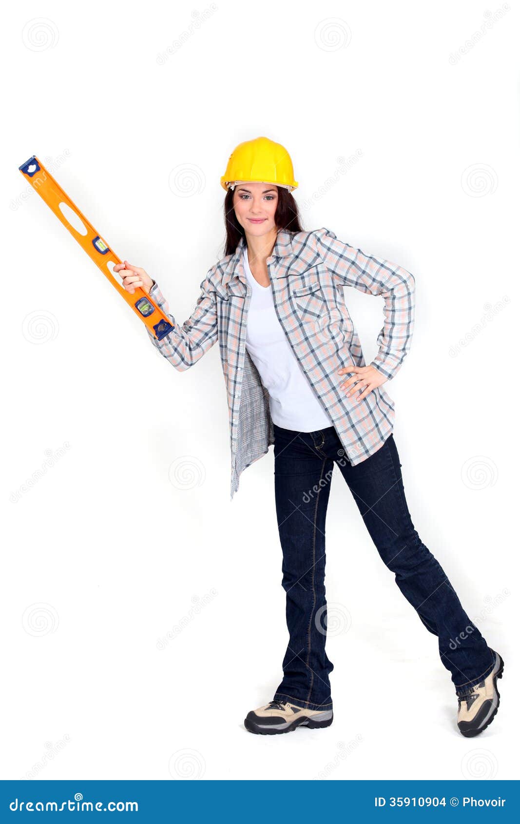 Woman with a spirit level stock photo. Image of home - 35910904