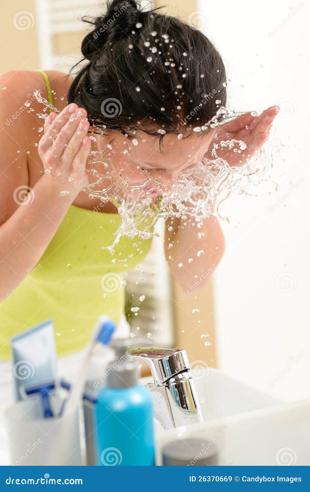 Woman Splashing Water on Face in Bathroom Stock Image - Image of ...