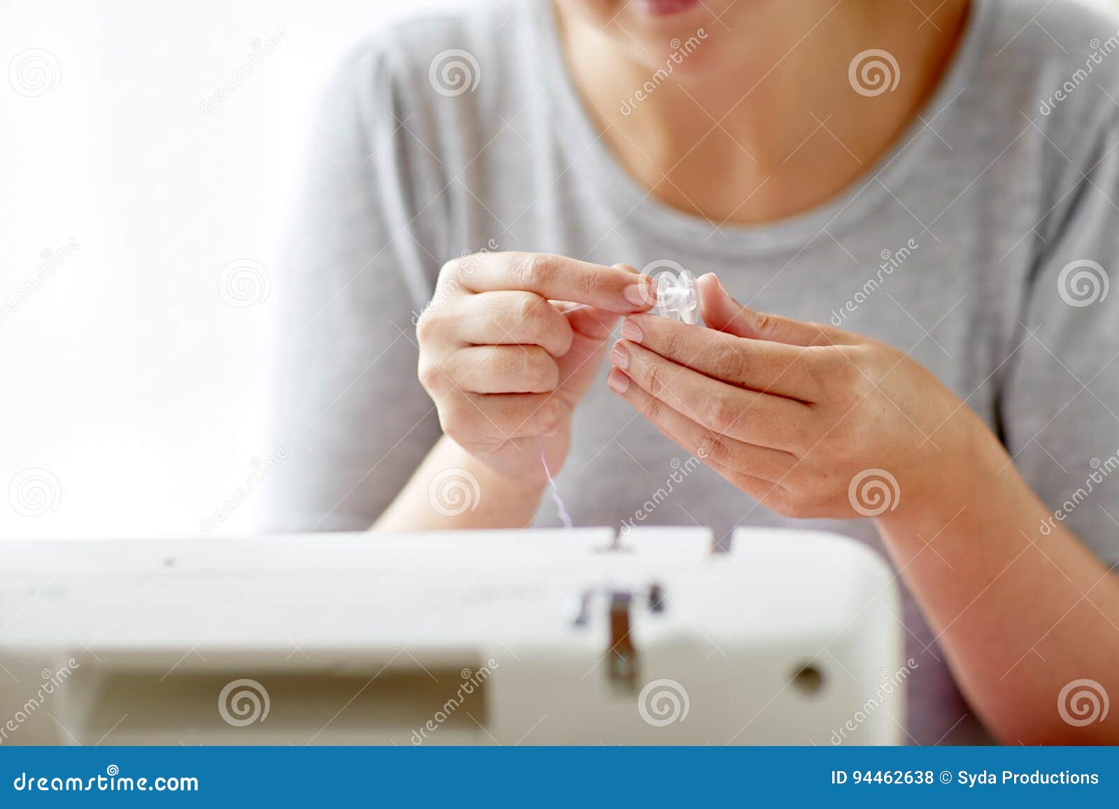 Woman with Spool of Thread and Sewing Machine Stock Photo - Image of ...