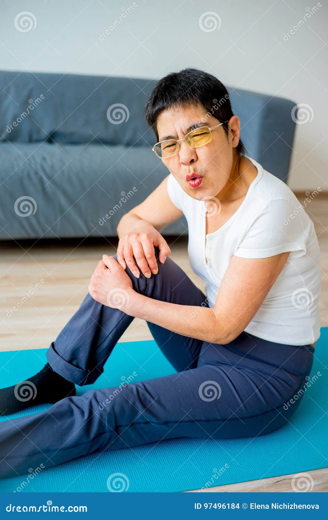 Woman sprained her leg stock photo. Image of adult, sprain - 97496184
