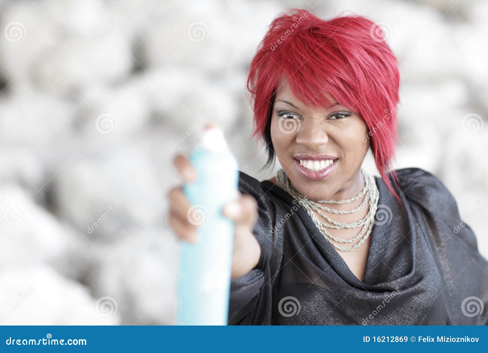 Woman spraying spraypaint stock image. Image of lady - 16212869