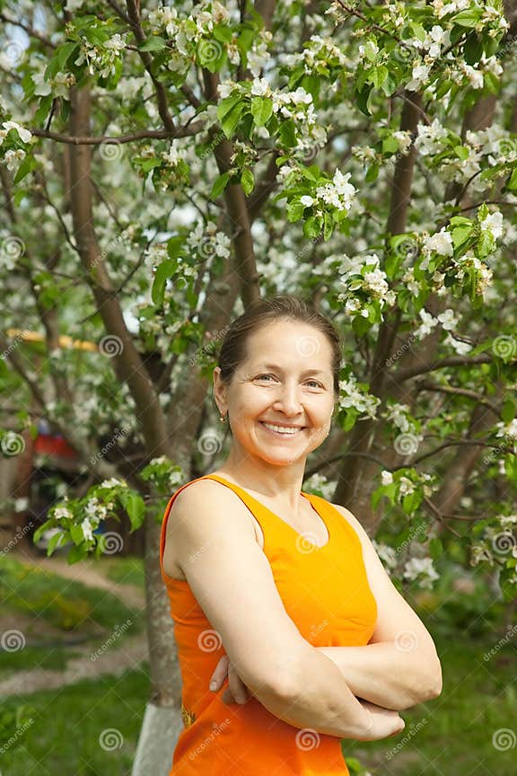 Woman in spring garden stock image. Image of outdoors - 14978963