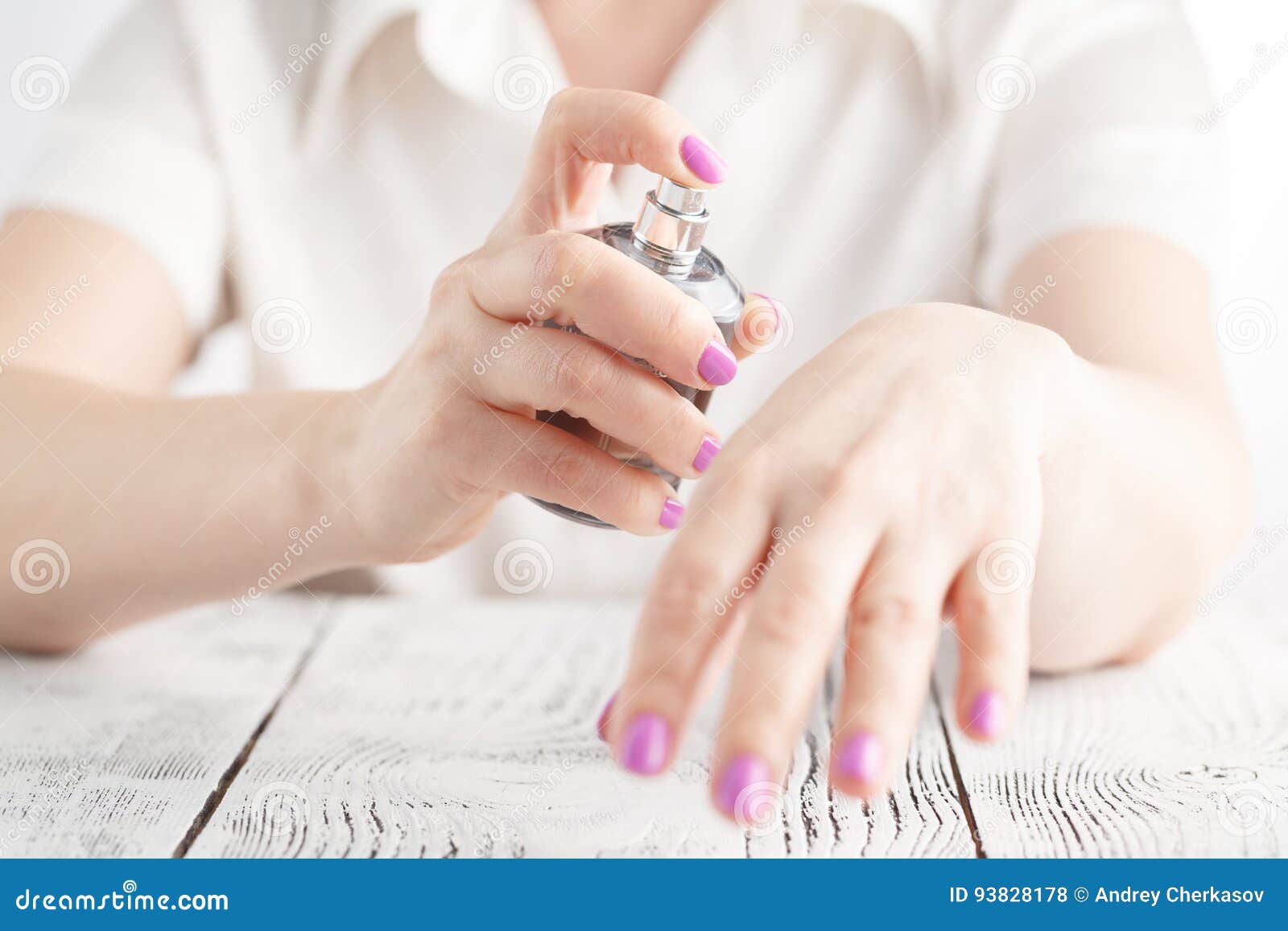 Woman Sprinkle Perfume on Her Wrist Stock Photo - Image of essence ...