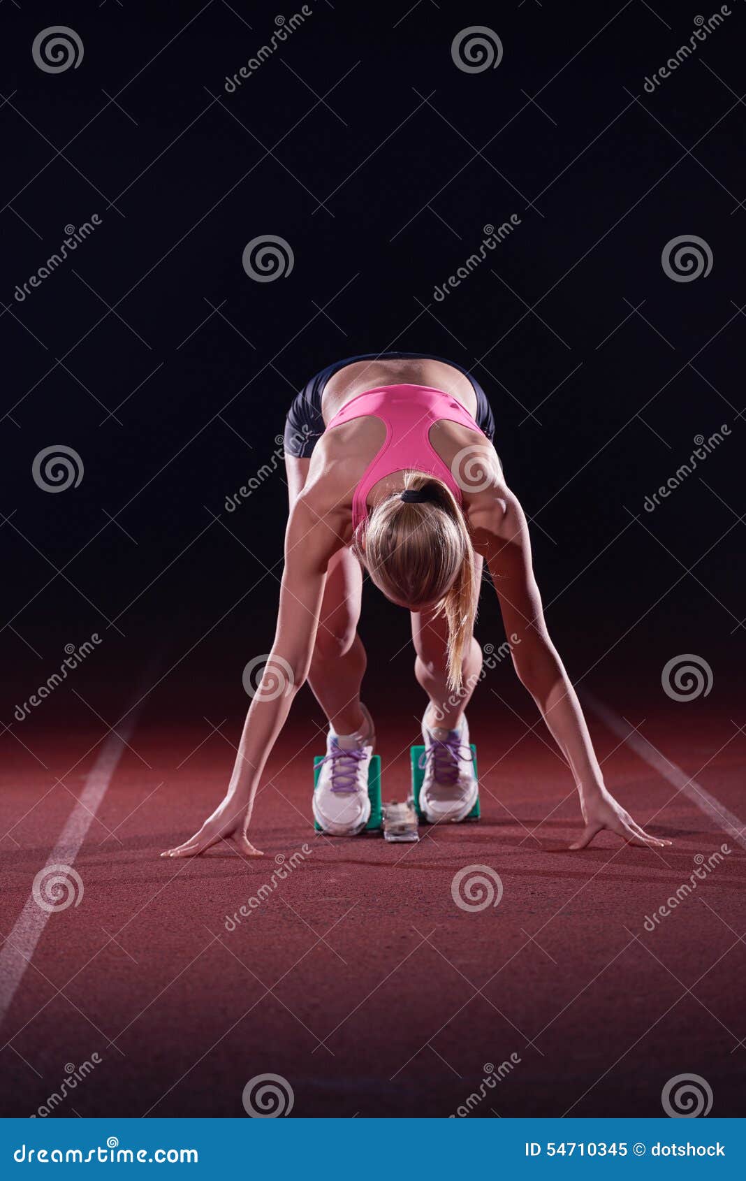Woman Sprinter Leaving Starting Blocks Stock Image - Image of ...