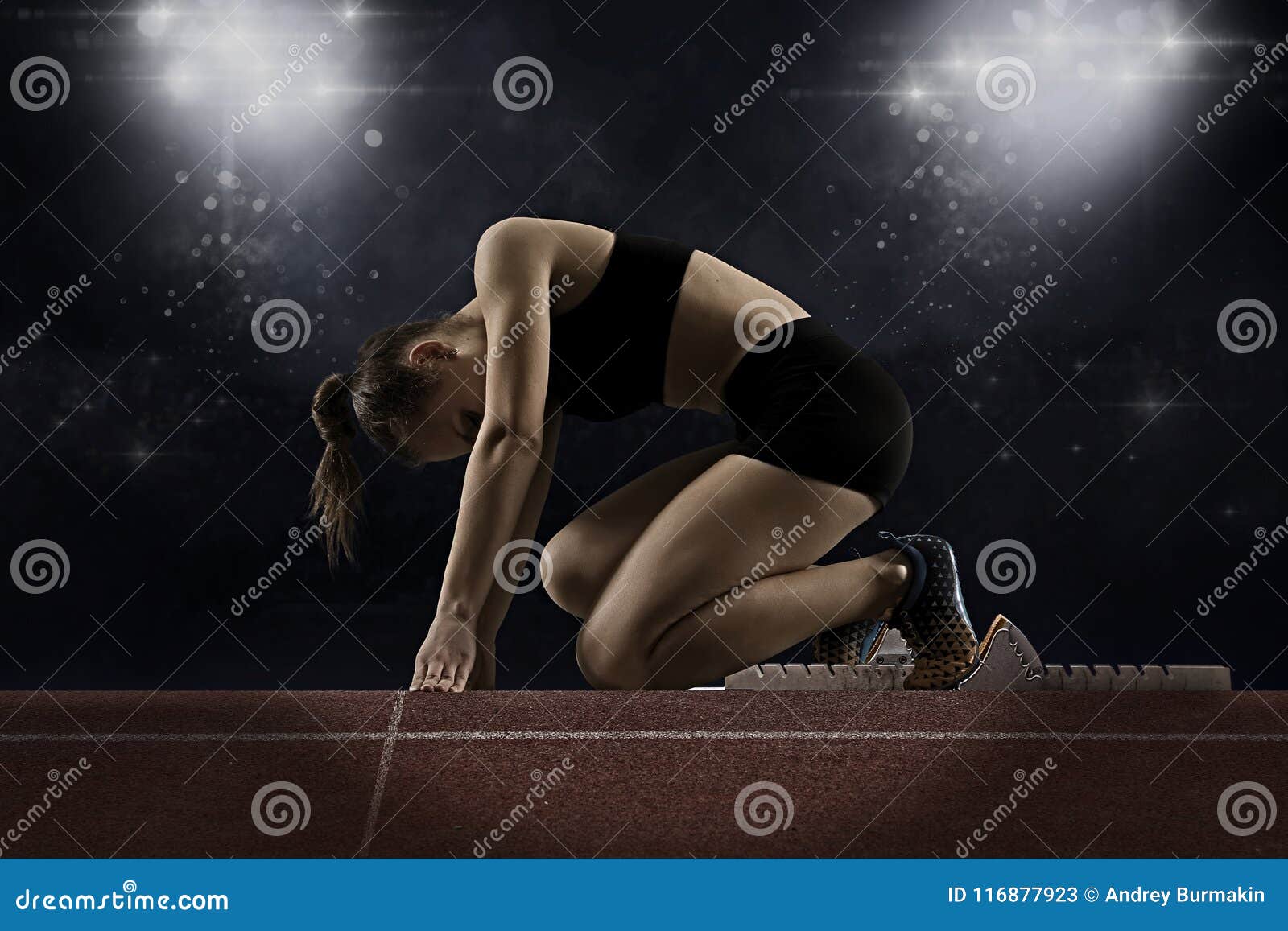 Woman Sprinter Leaving Starting Blocks Stock Image - Image of start ...