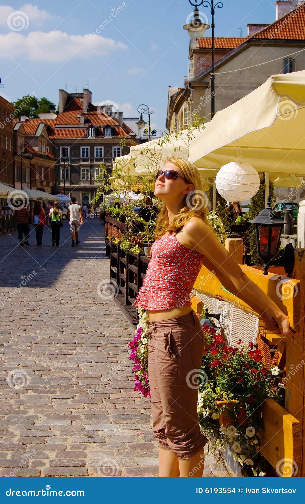 Woman on the square stock photo. Image of lights, tourism - 6193554