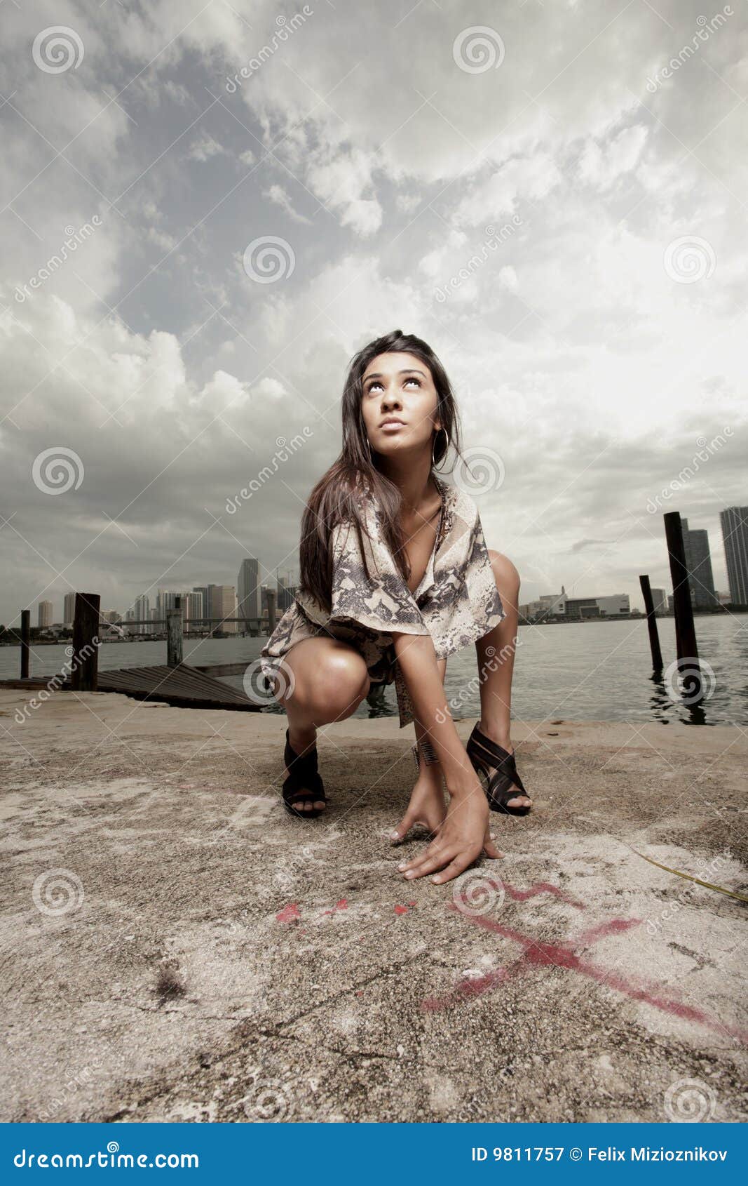 Woman in a Squatting Position Stock Image - Image of clouds, upward ...