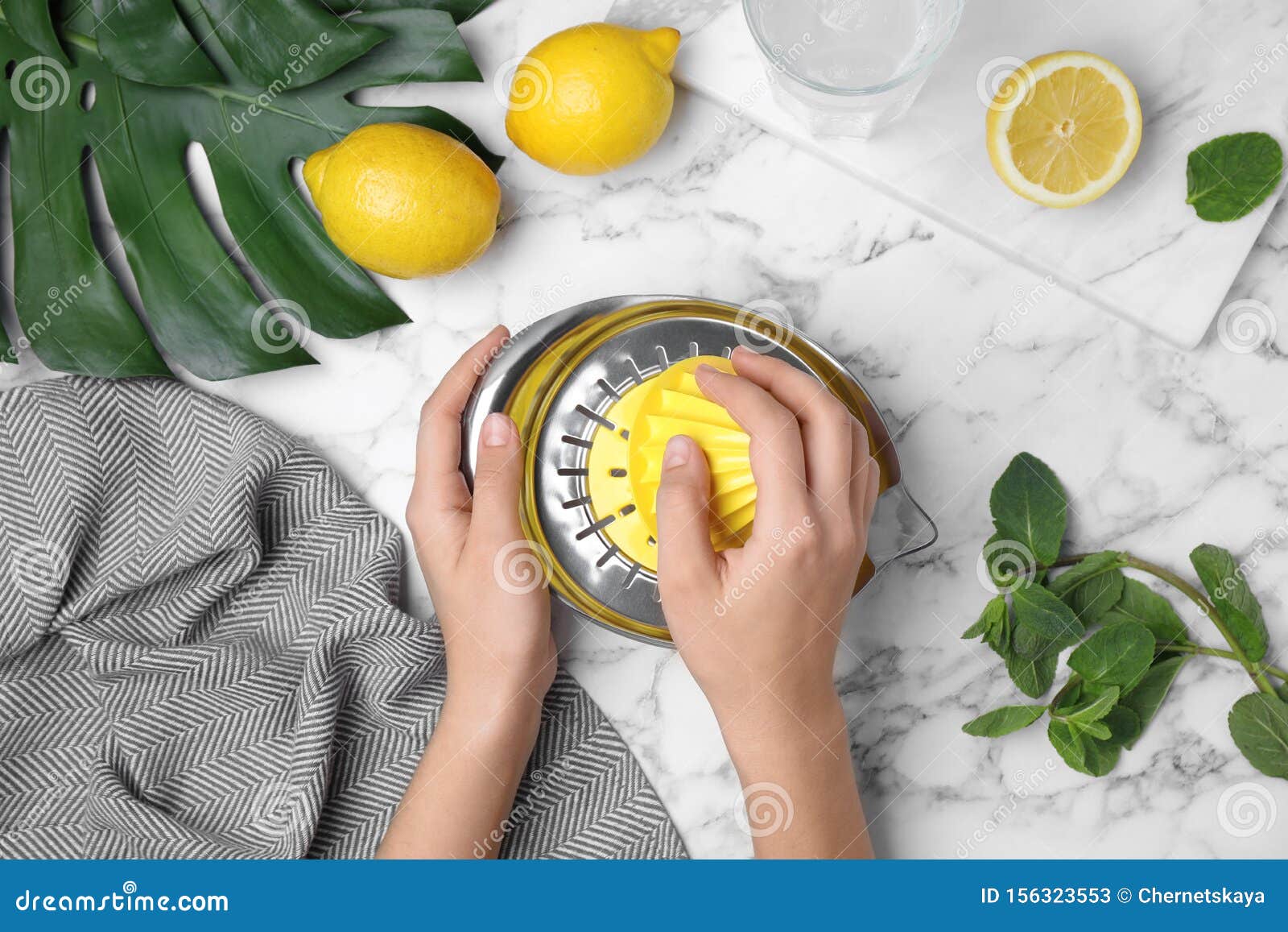 Woman with Squeezer and Ingredients for Lemonade at Marble Table Stock ...