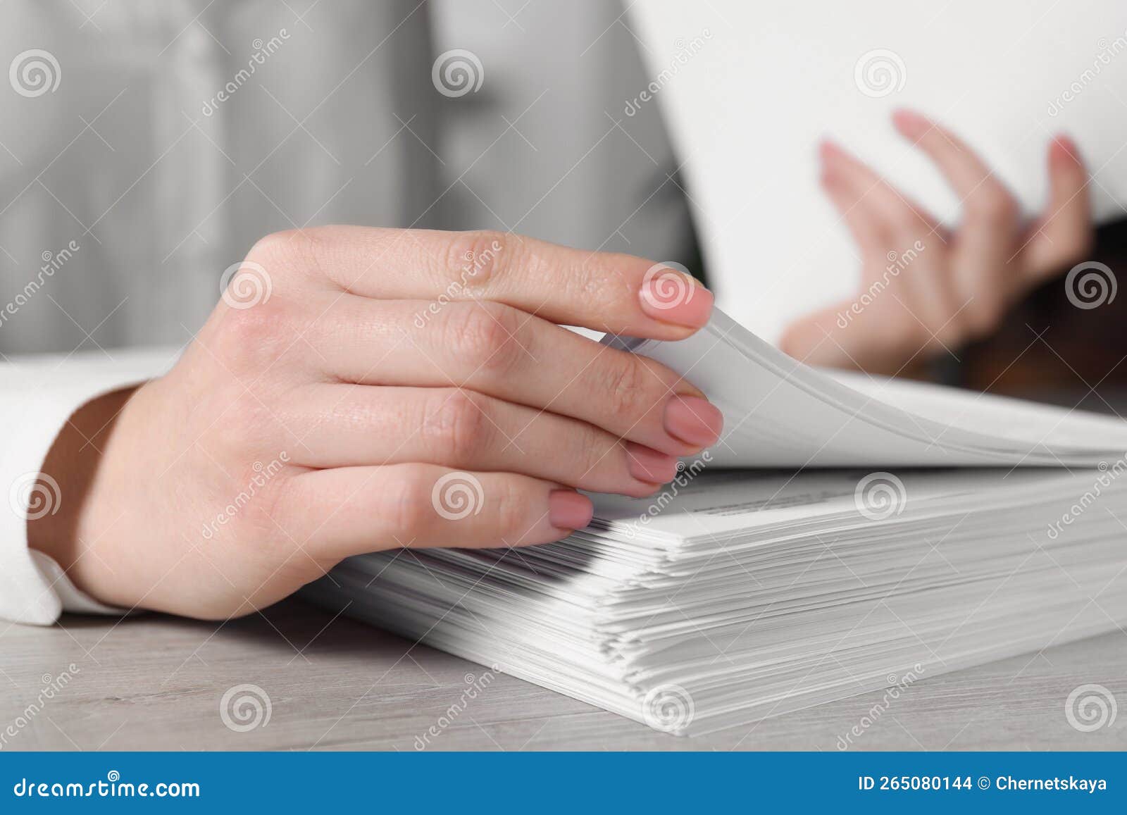 Woman Stacking Documents at Table in Office, Closeup Stock Photo ...