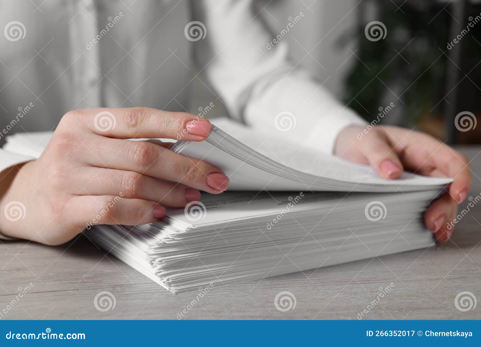 Woman Stacking Documents at Table in Office, Closeup Stock Image ...