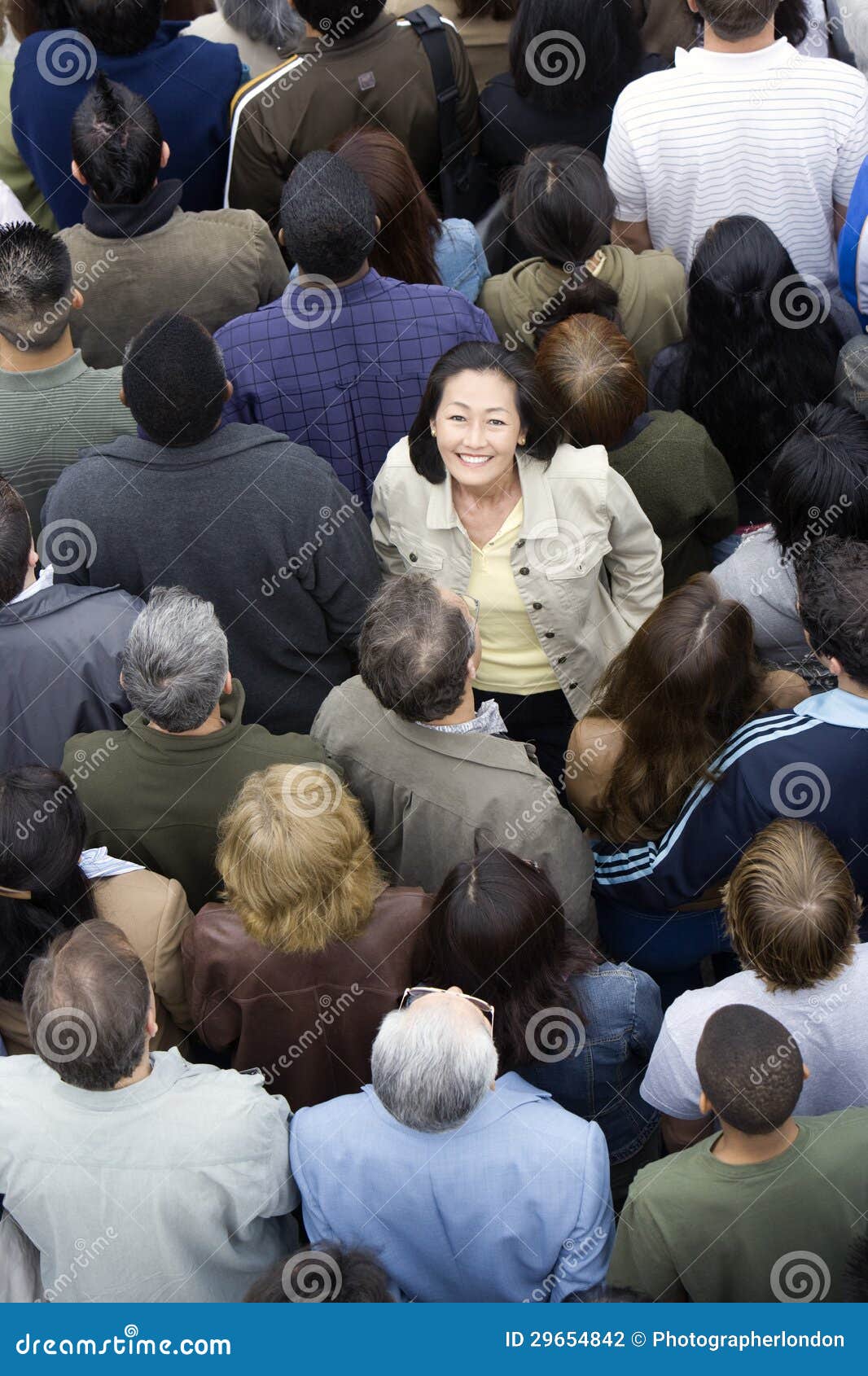 Woman Standing Amidst Around People Stock Photos - Free & Royalty-Free ...