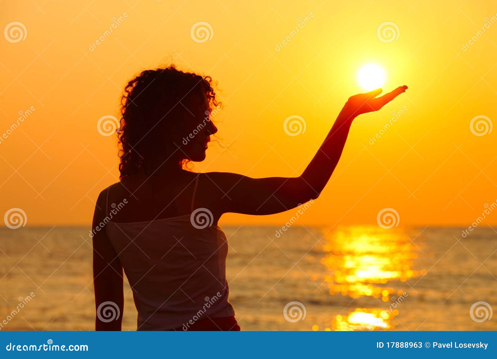 Woman Standing on Beach, Holding Sun in Hand Stock Image - Image of ...