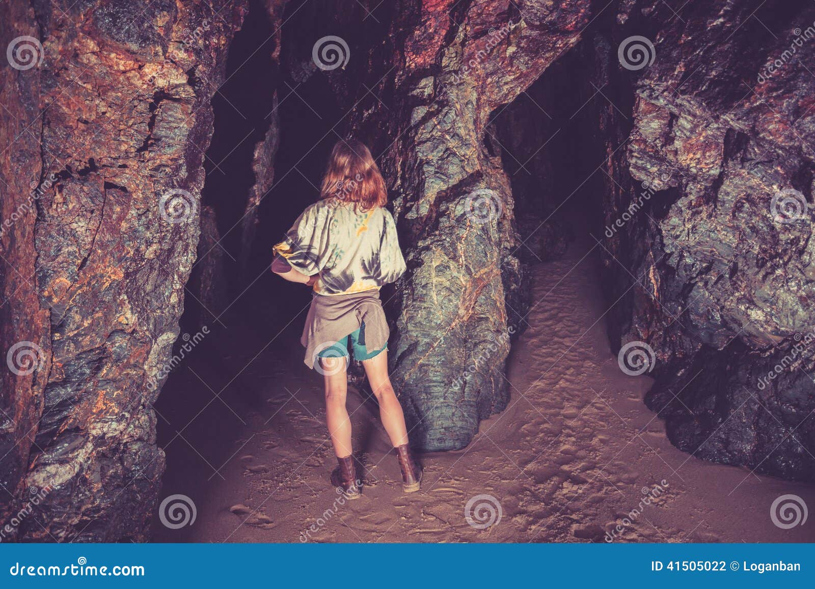 Woman standing in cave stock photo. Image of rock, adventure - 41505022