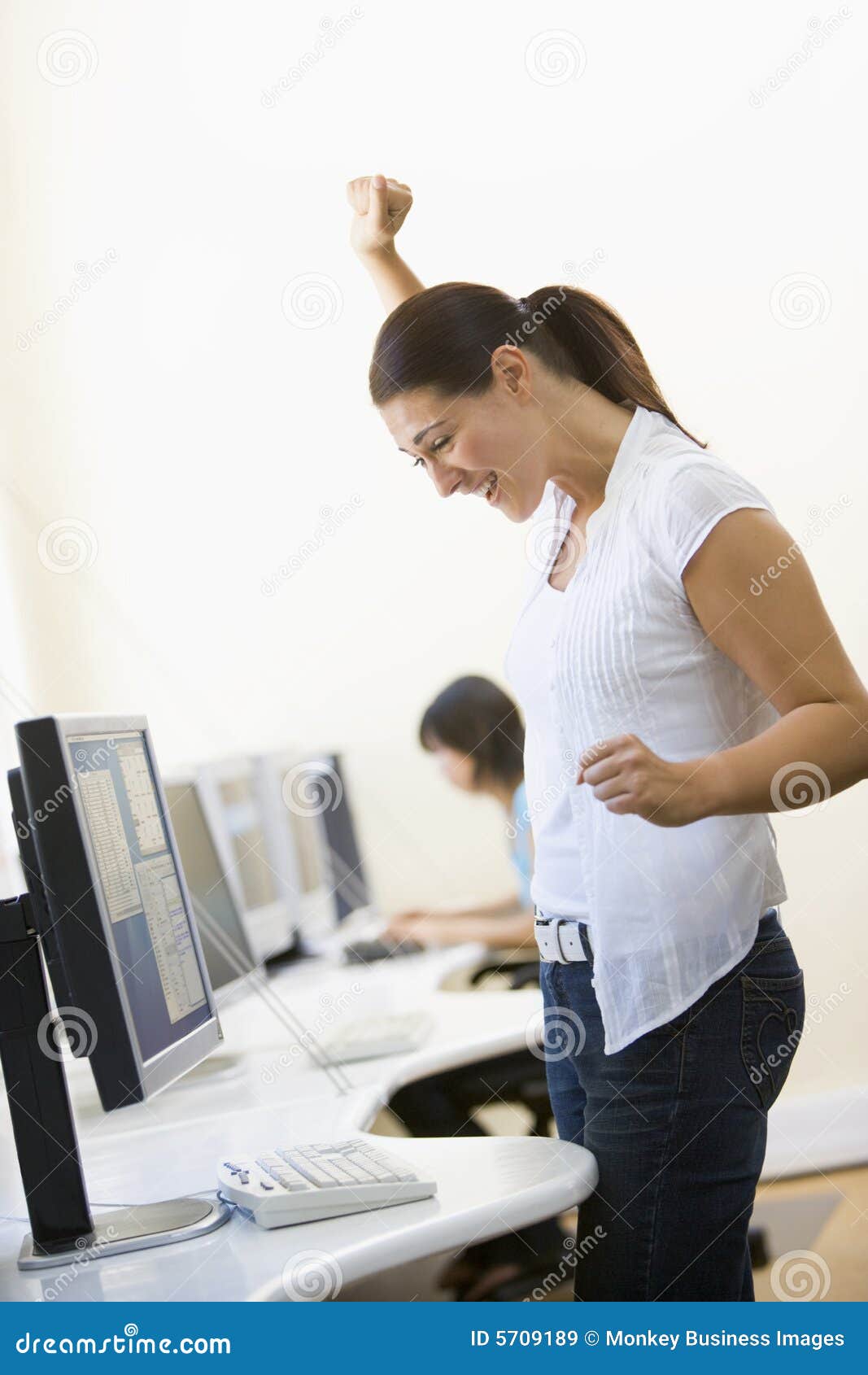 Woman Standing in Computer Room Cheering Stock Image - Image of smile ...