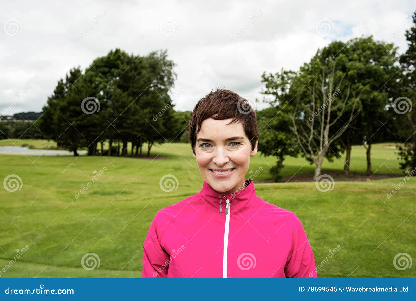 Woman Standing in Golf Course Stock Image - Image of adult, golf: 78699545