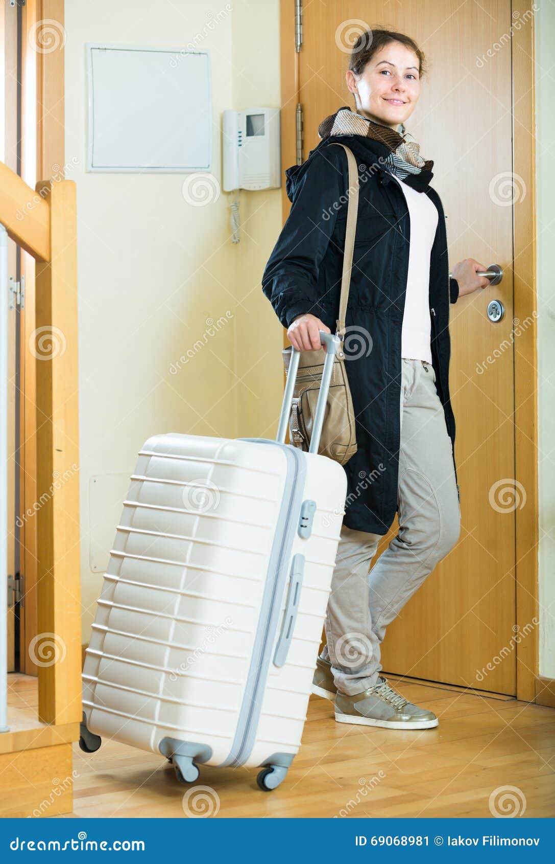 Woman standing in hall stock image. Image of doorway - 69068981