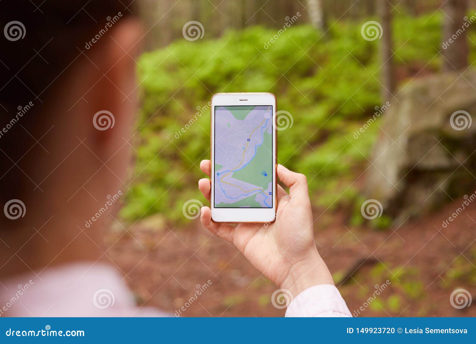 Woman Standing in Middle of Nowhere, Using Navigation App on Smartphone ...