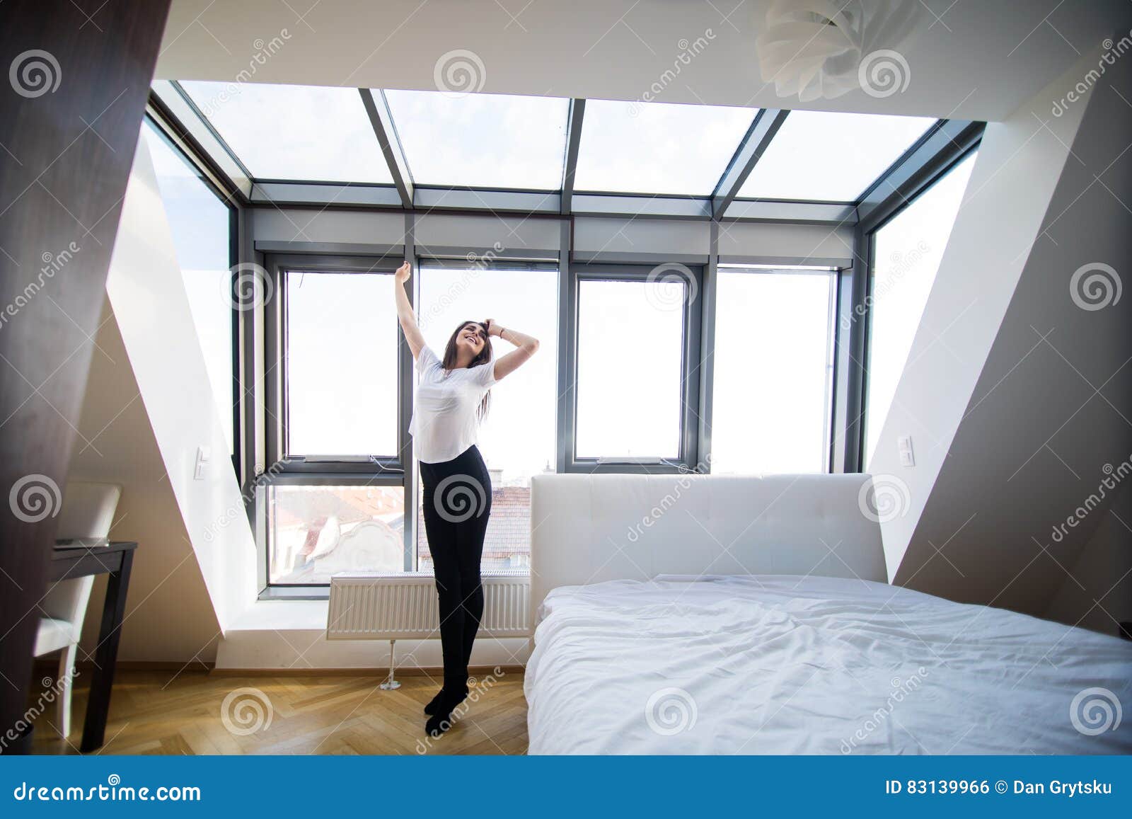 Woman Standing Near the Window Stock Photo - Image of color, healthy ...