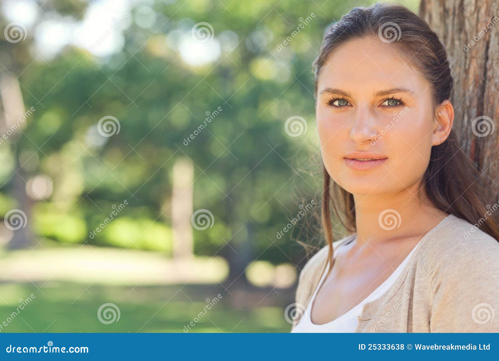 Woman Standing Next To a Tree Stock Photo - Image of young, camera ...