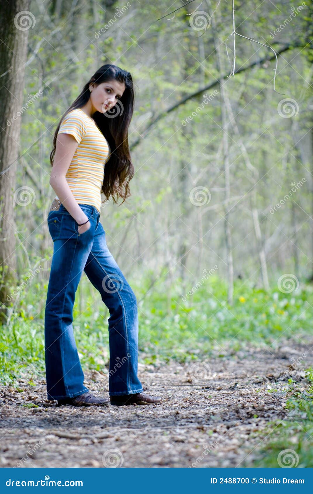 Woman standing on path stock photo. Image of warm, trail - 2488700